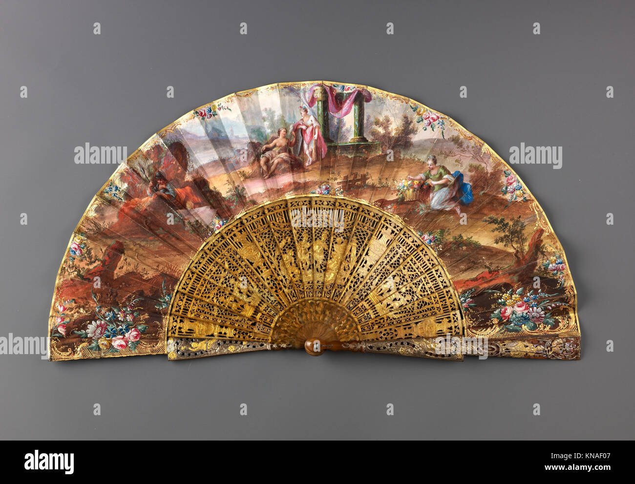 This folding fan features an artistic depiction of Romulus and Remus ...