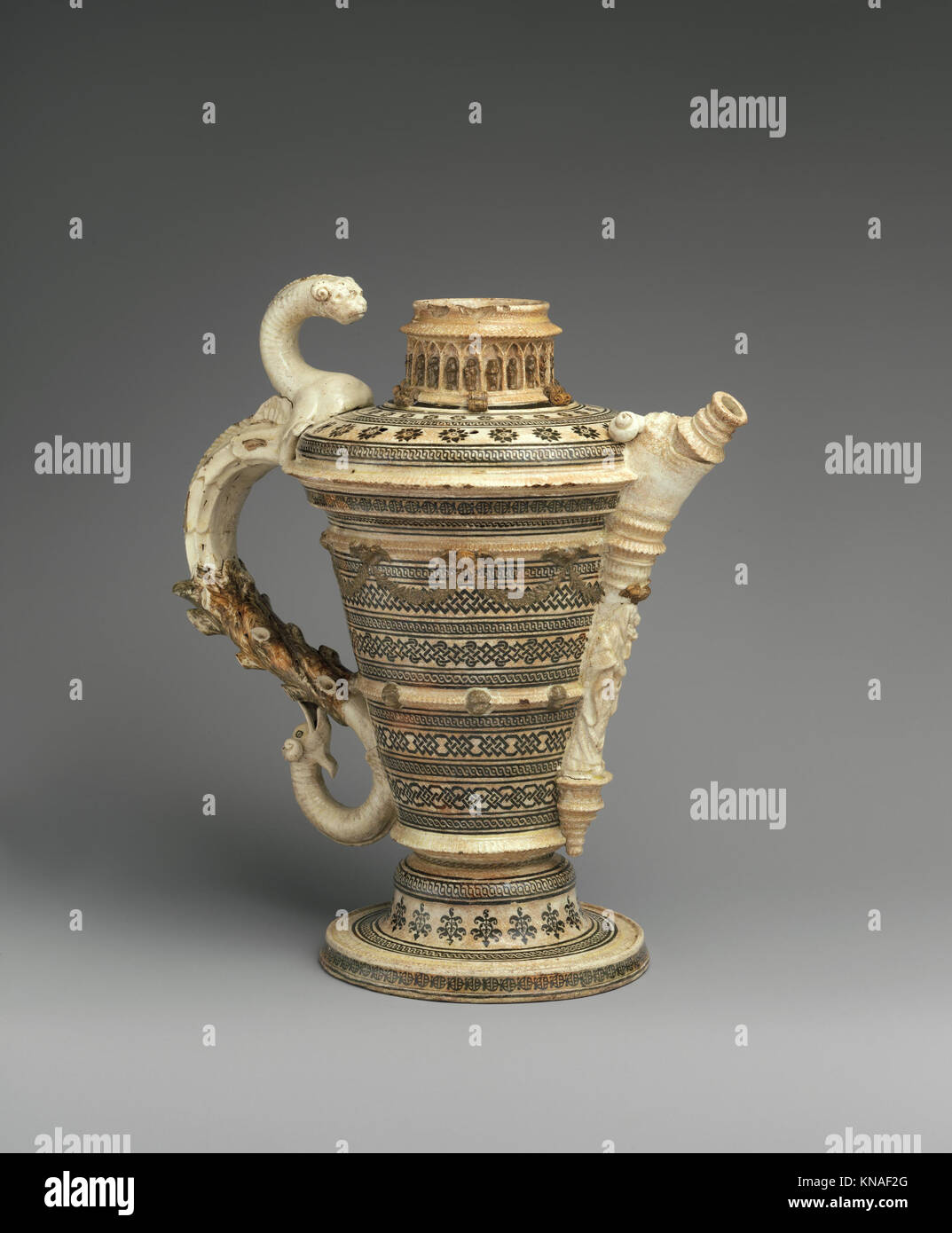 This ewer is a vessel used for holding liquids, characterized by its ...