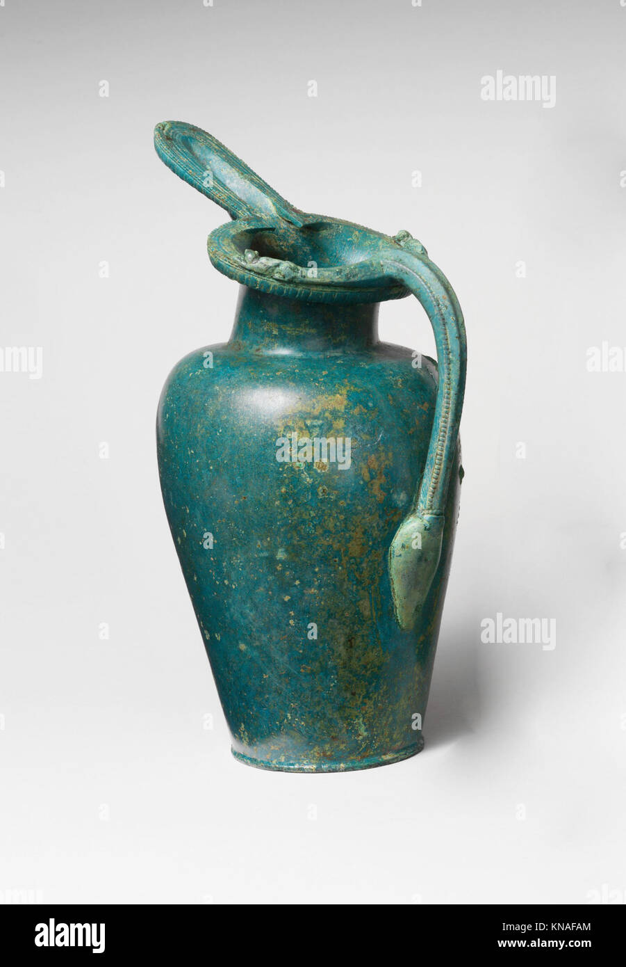 This bronze oinochoe is an ancient Greek jug used for pouring liquids ...