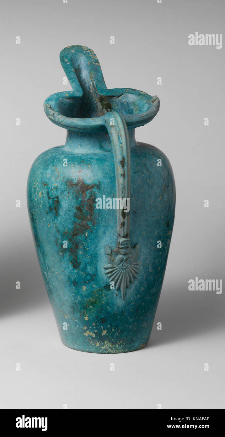 This bronze oinochoe, a type of ancient Greek jug, is designed for ...
