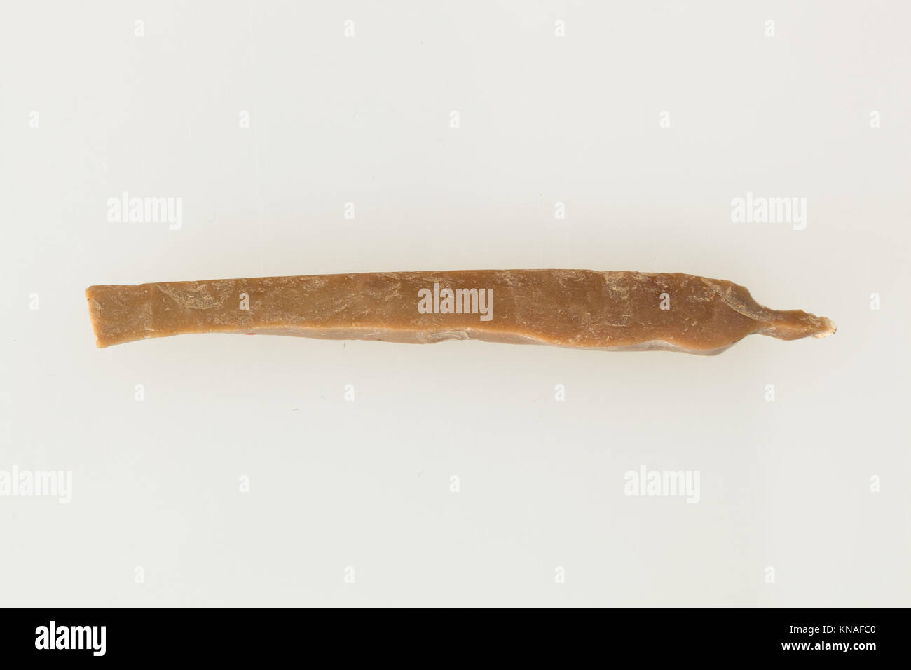 This sickle blade represents a tool used in ancient agricultural ...