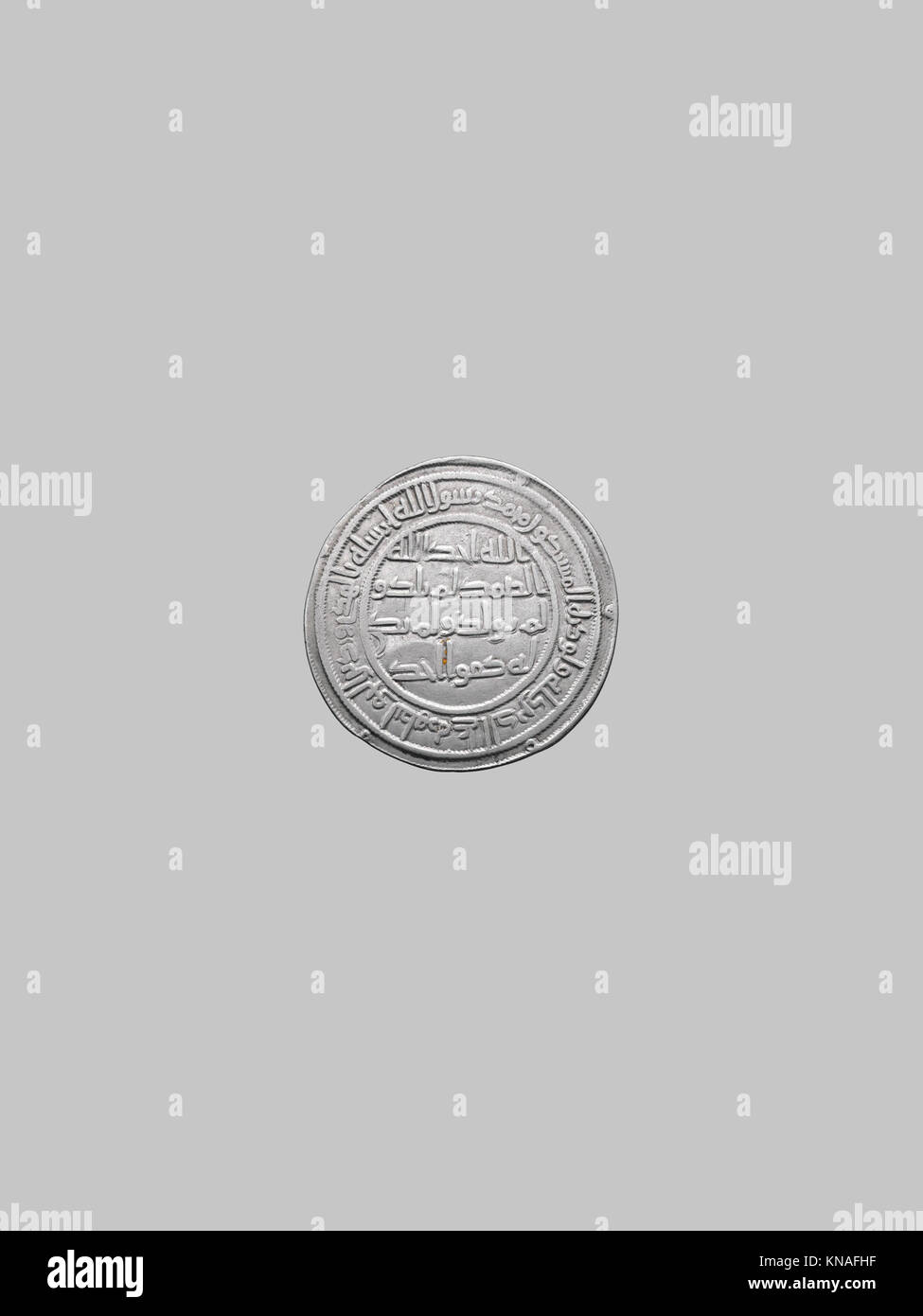 This Dirham coin, minted in the Islamic world, showcases the artistry ...