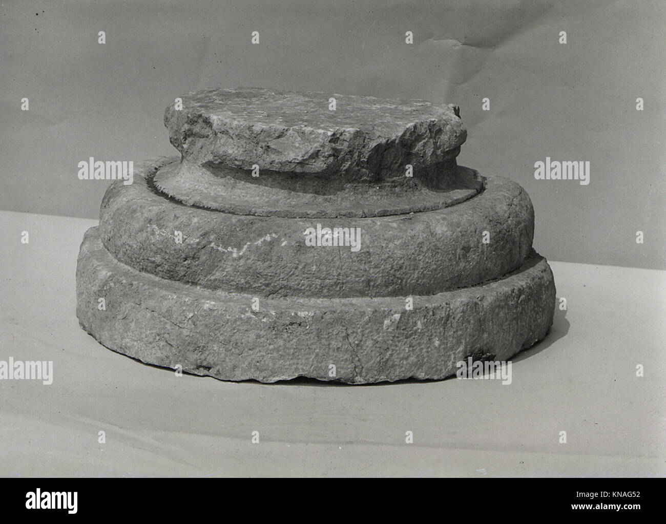 This classical column base displays detailed carving and craftsmanship ...