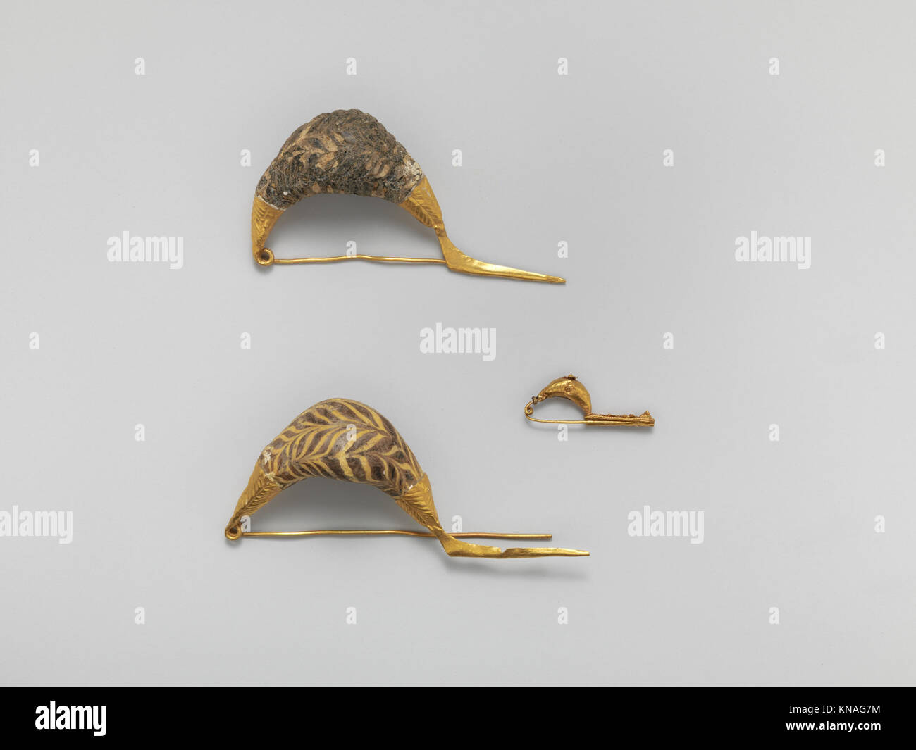 A pair of gold fibulae, also known as safety pins, from the Etruscan ...