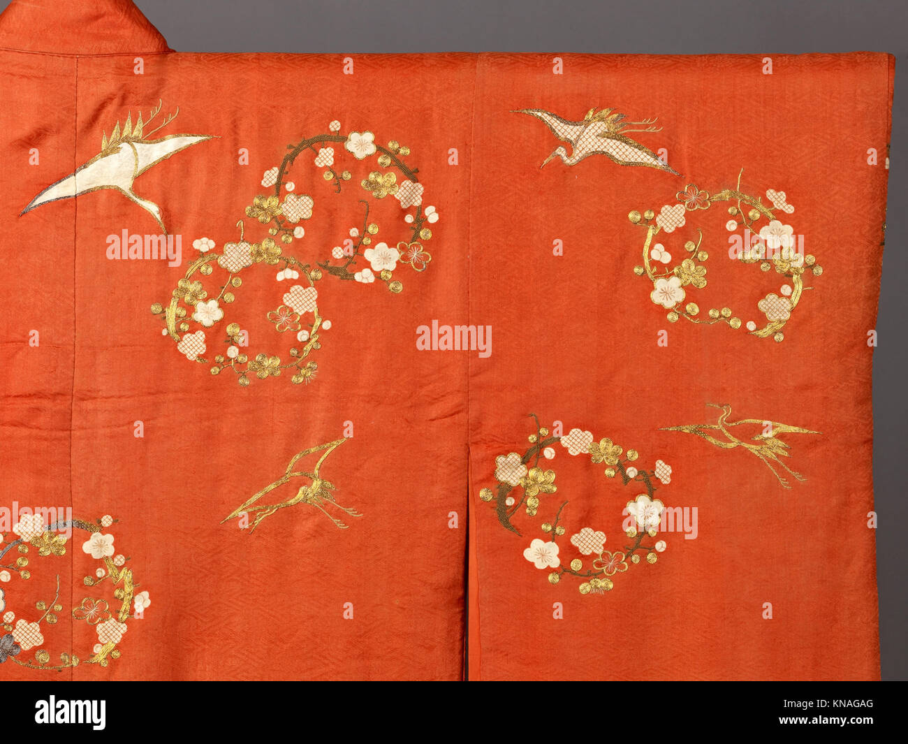 A Furisode kimono with elaborate designs, characterized by its long ...