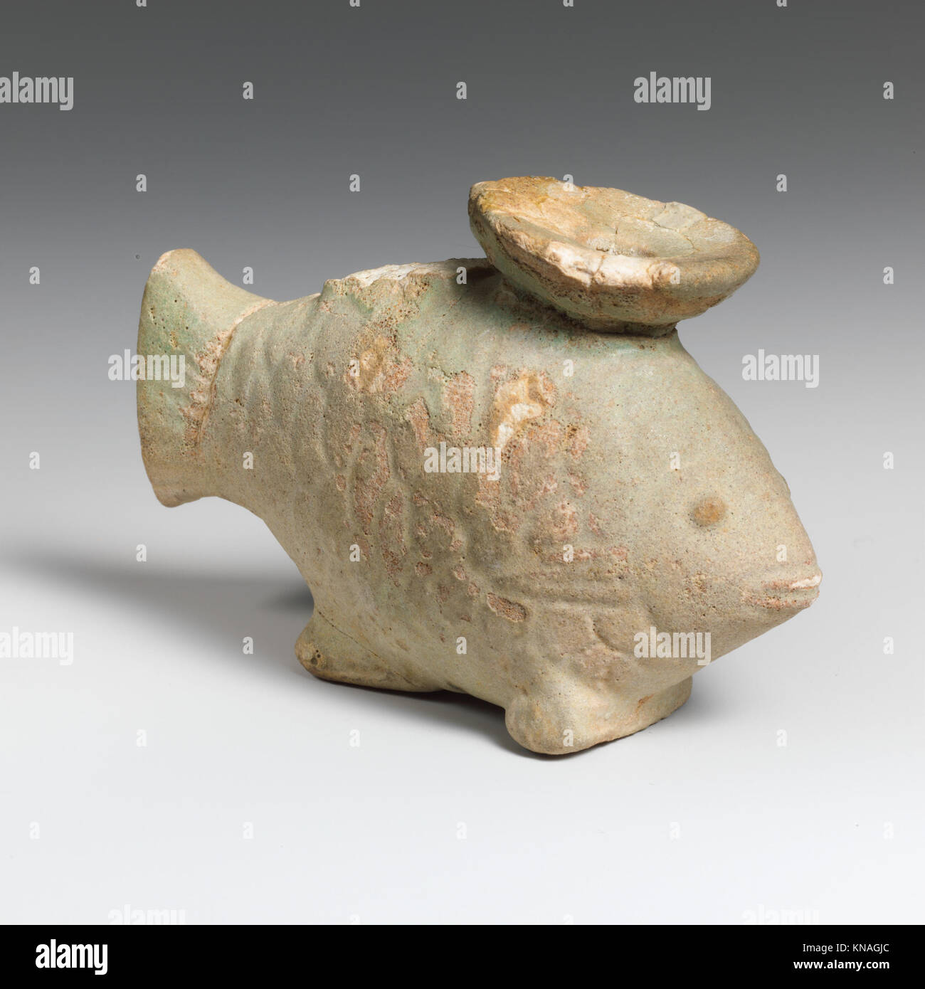 This East Greek faience aryballos from the 6th century B.C., shaped as ...