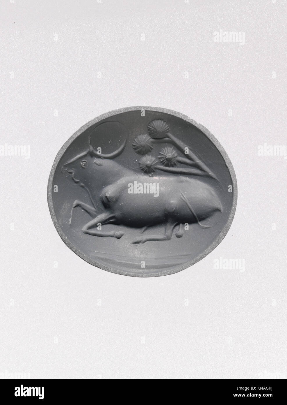 An agate lentoid, a type of gemstone or decorative object, showcasing ...