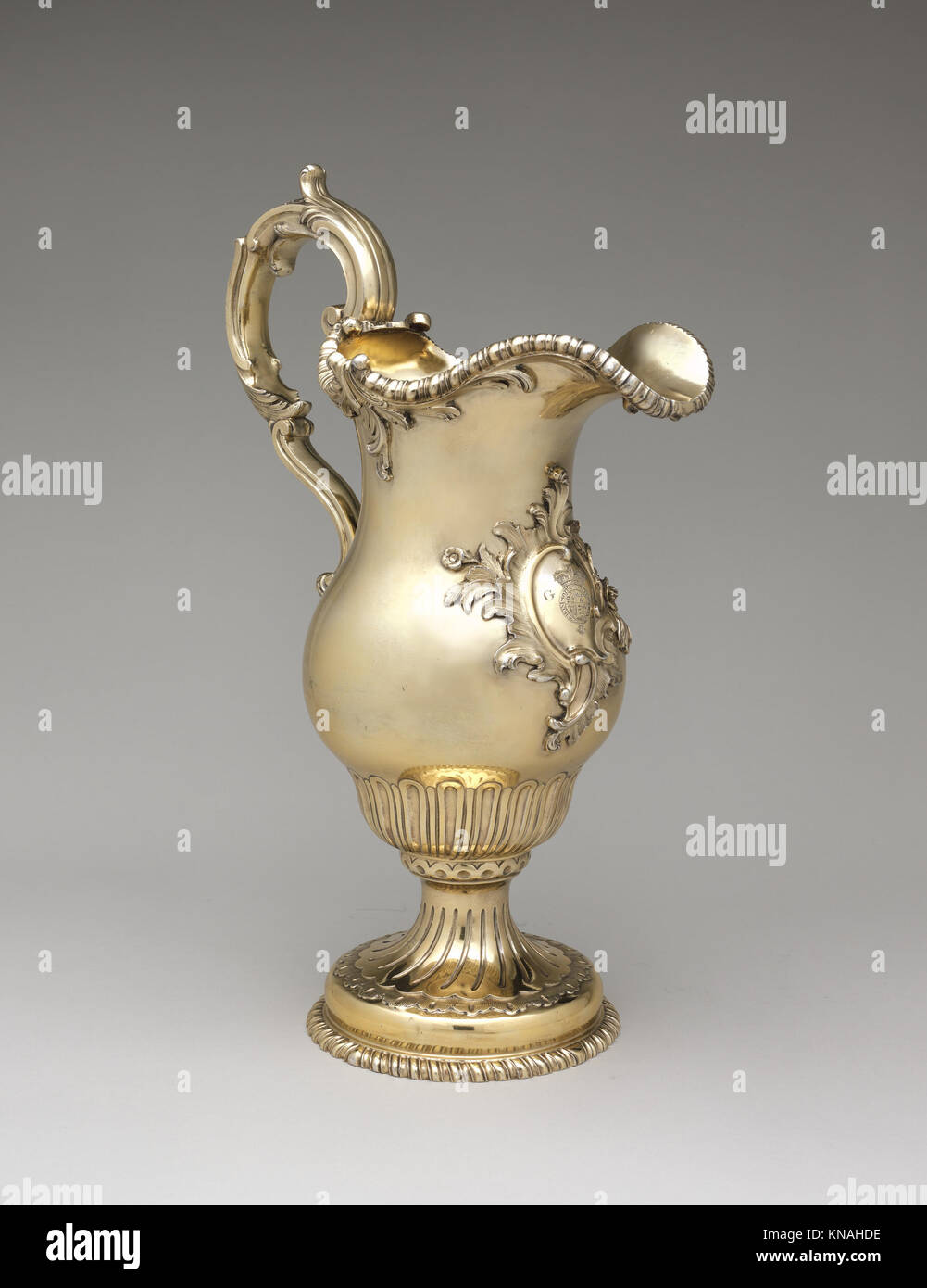 This ewer is a traditional vessel used for pouring liquids, crafted ...