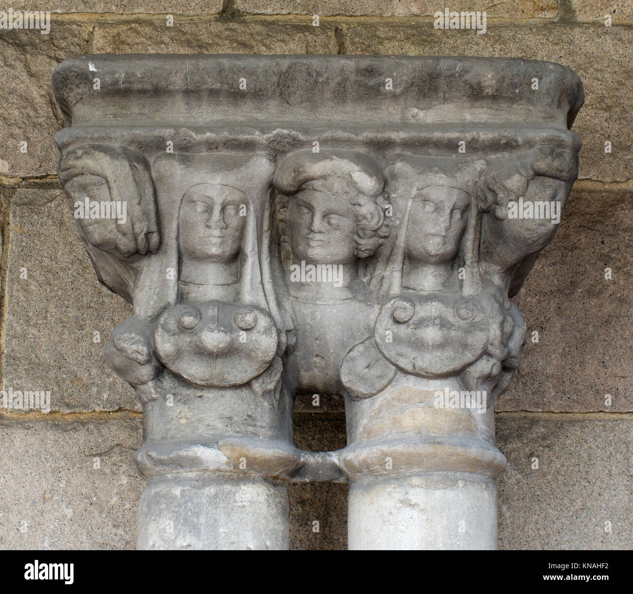 This double capital, made of stone, is a classical architectural ...
