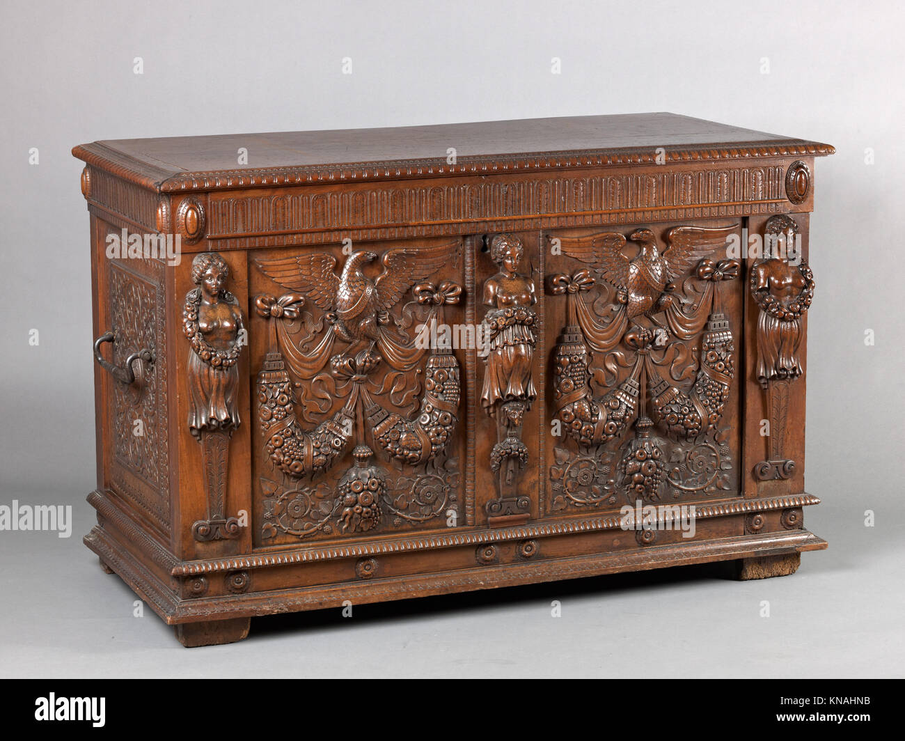 This credence, or chest, serves as both a functional and decorative ...