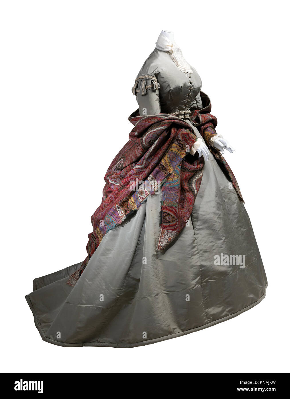 This ensemble is a historical outfit displaying textile craftsmanship ...