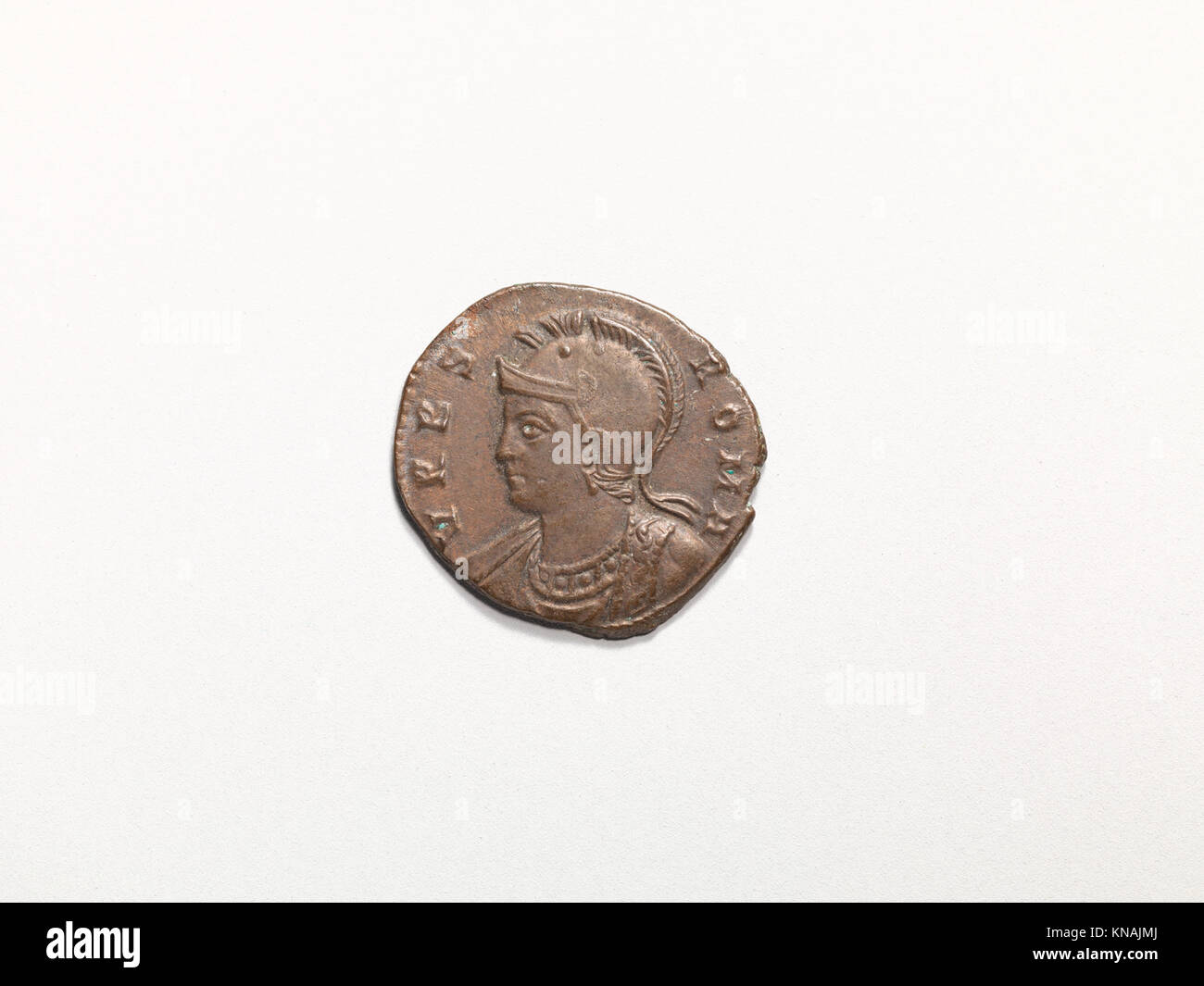 These bronze coins, part of the museum's collection, represent ...