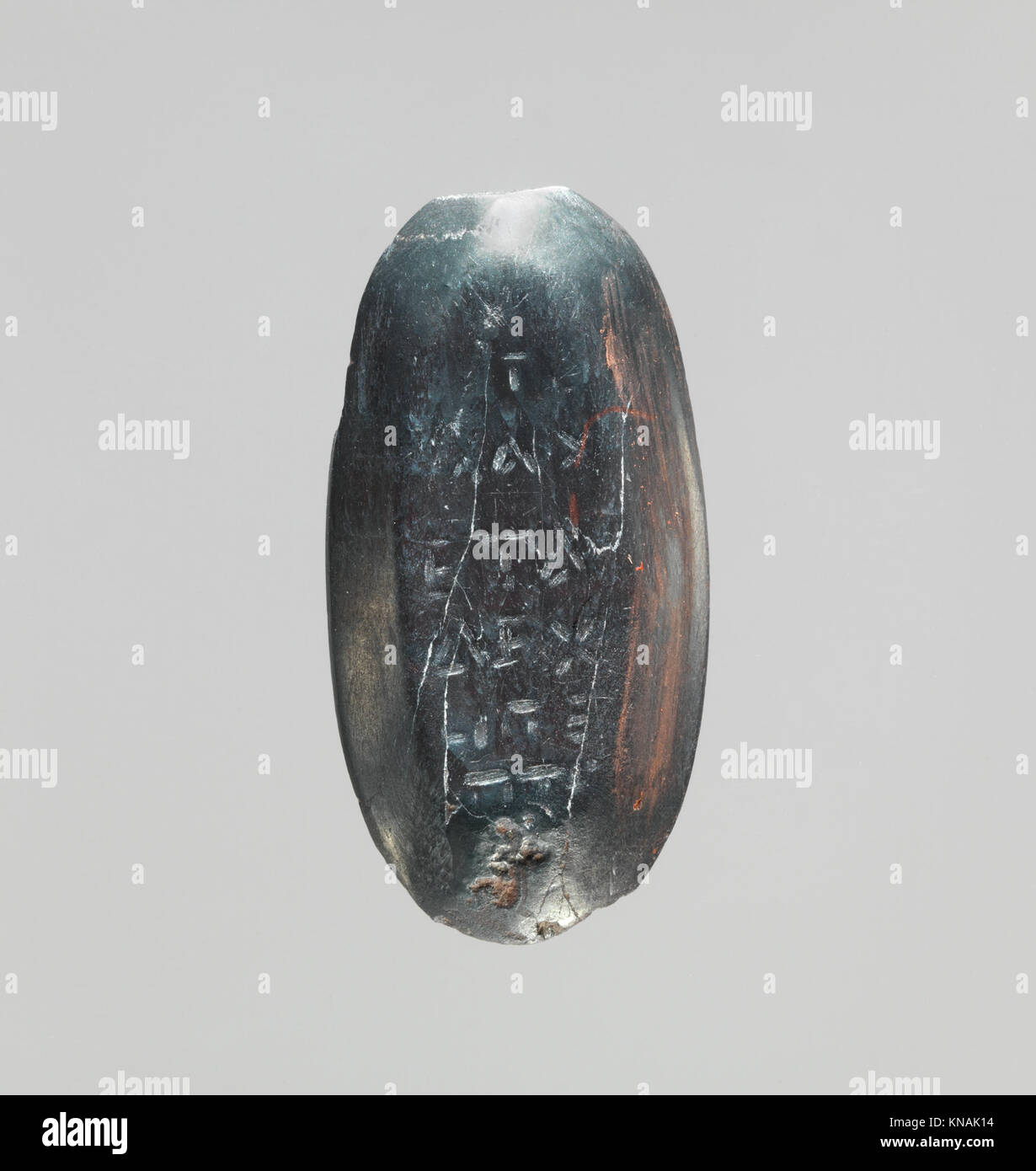 This hematite intaglio features a lion-headed god, a significant symbol ...