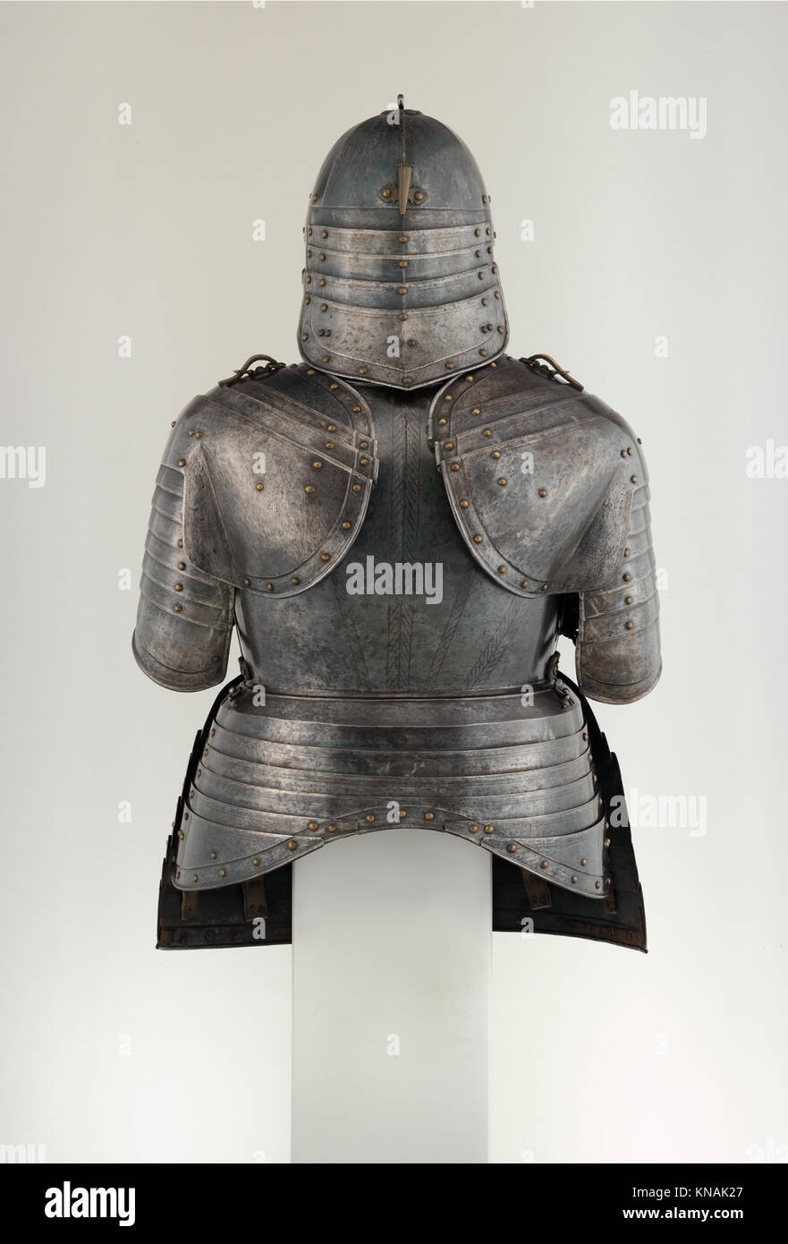 This piece of half armor, likely from the medieval period, features ...