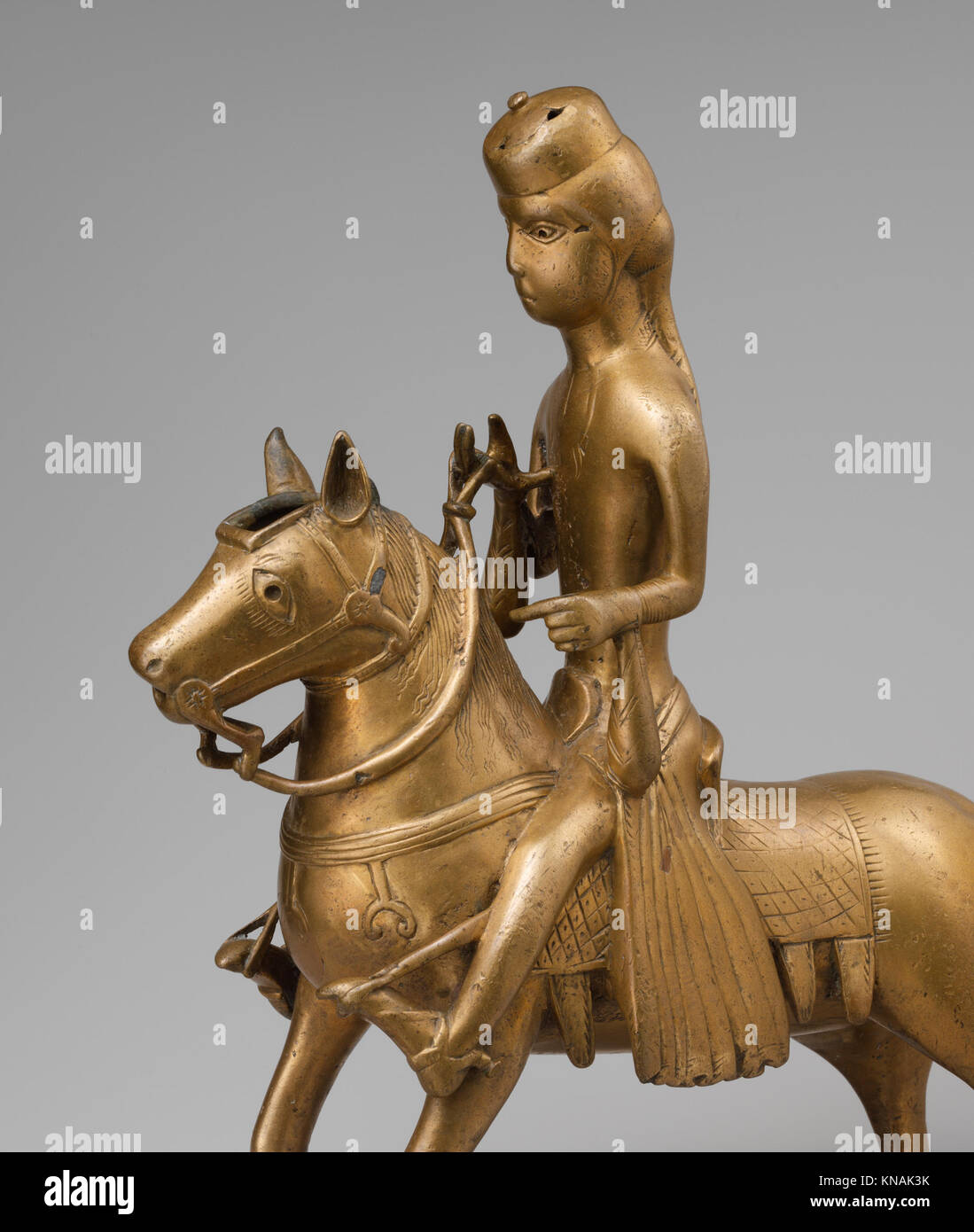 This medieval aquamanile, shaped as a falconer on horseback ...