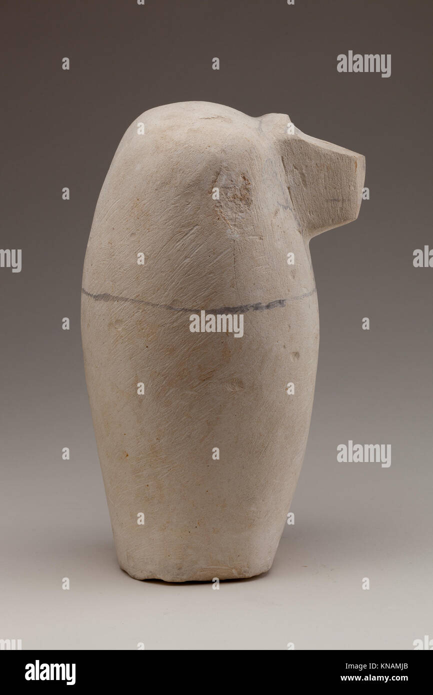 This dummy canopic jar features a lid sculpted in the likeness of the ...