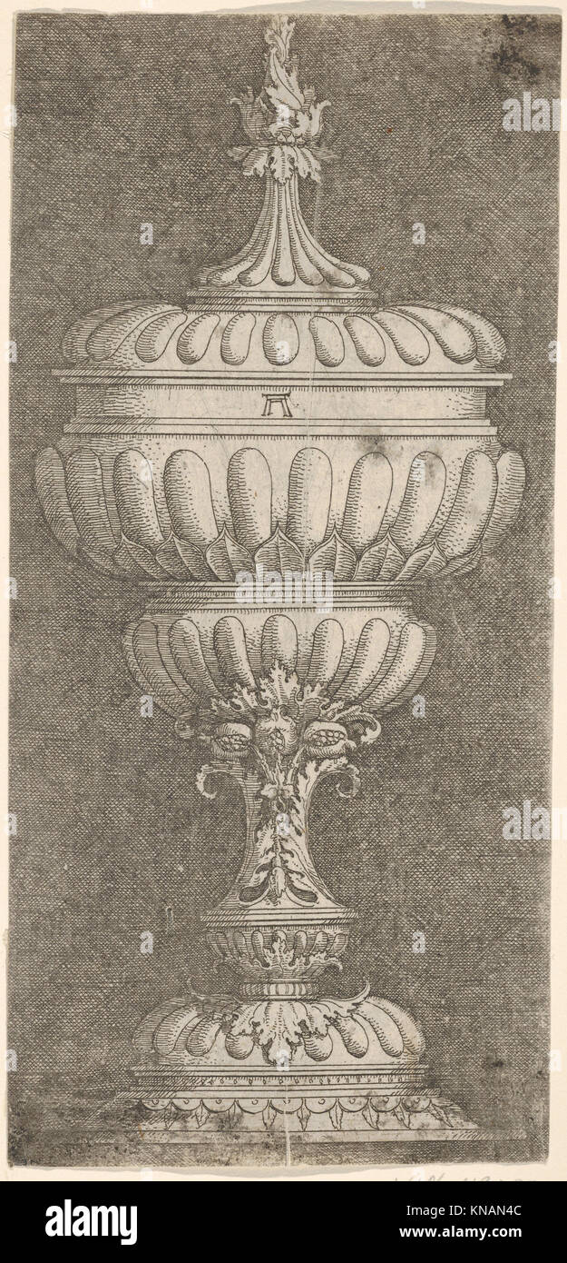 This covered goblet features three pomegranates as its decorative motif ...