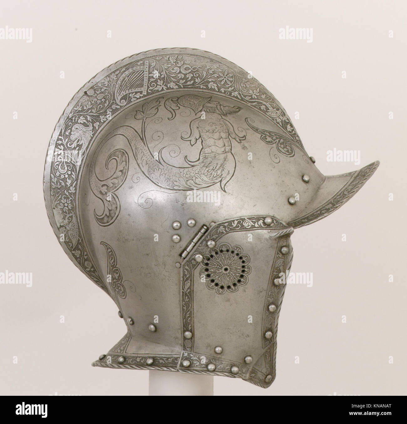 This Renaissance burgonet helmet was worn by soldiers for protection ...