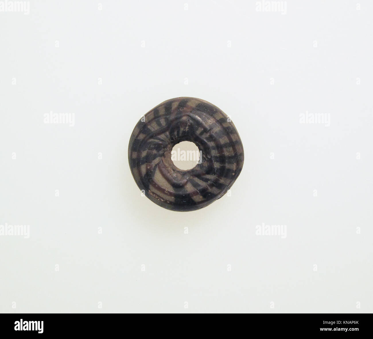 This bead features intricate design and craftsmanship, exemplifying the ...