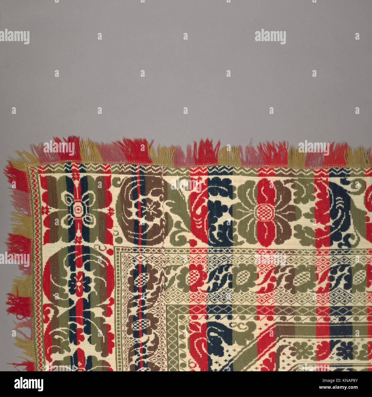 This coverlet is a textile artifact demonstrating detailed weaving ...