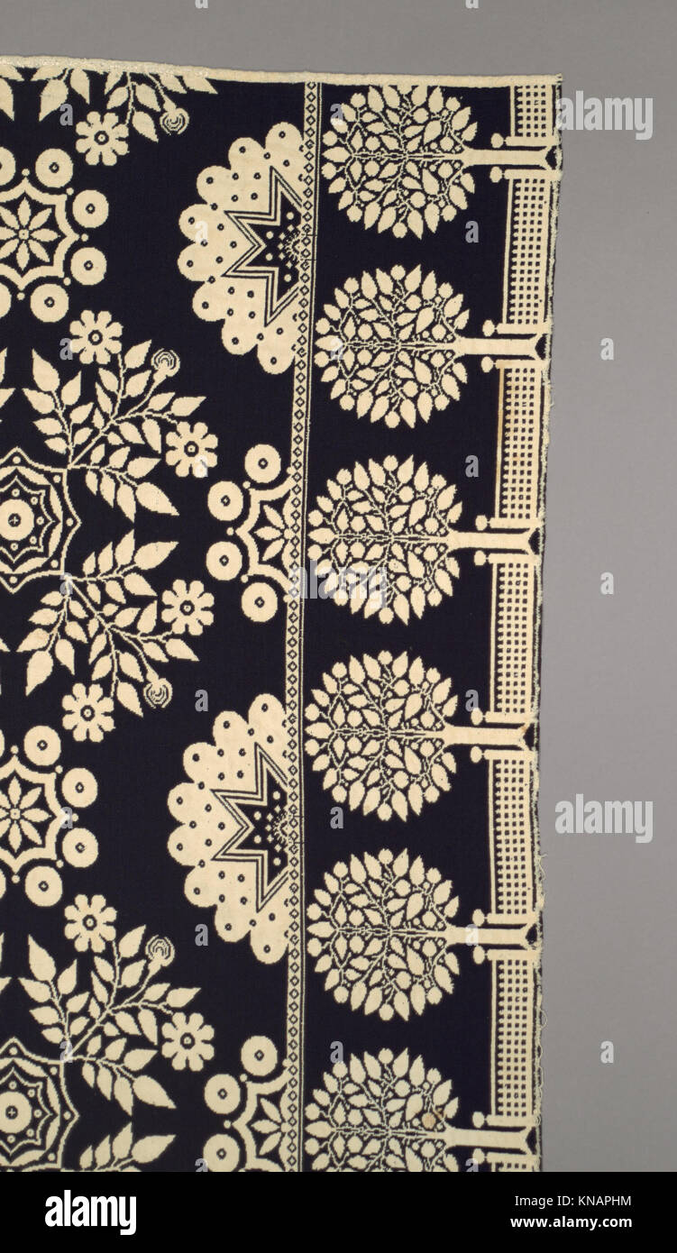 This coverlet is a historical textile featuring intricate weaving and ...