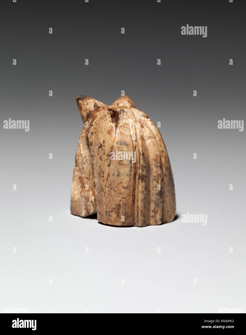 This chess piece represents a bishop, a key figure in the game of chess ...