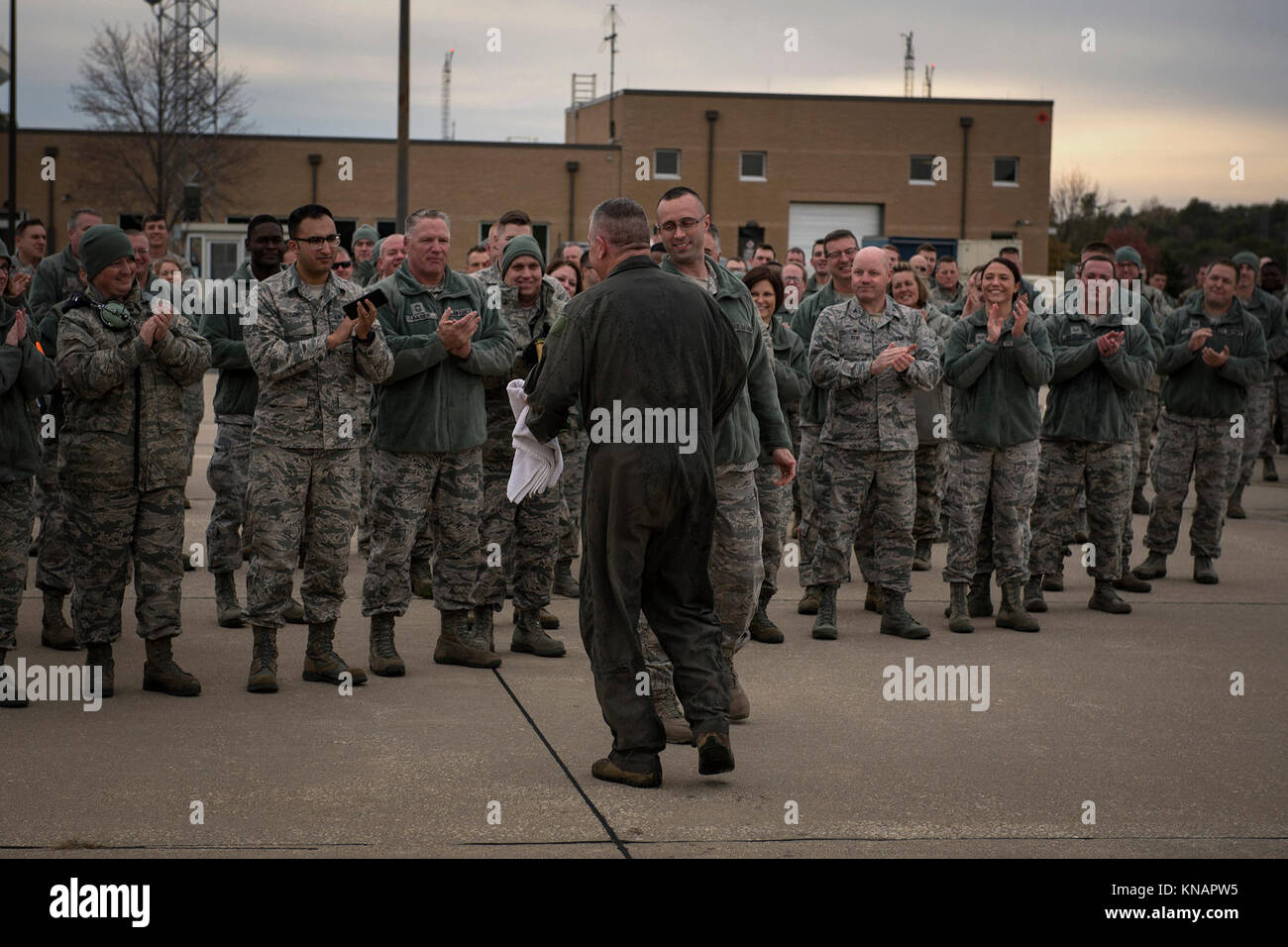 Airmen applaud Col. William Robertson, the commander of the 182nd ...