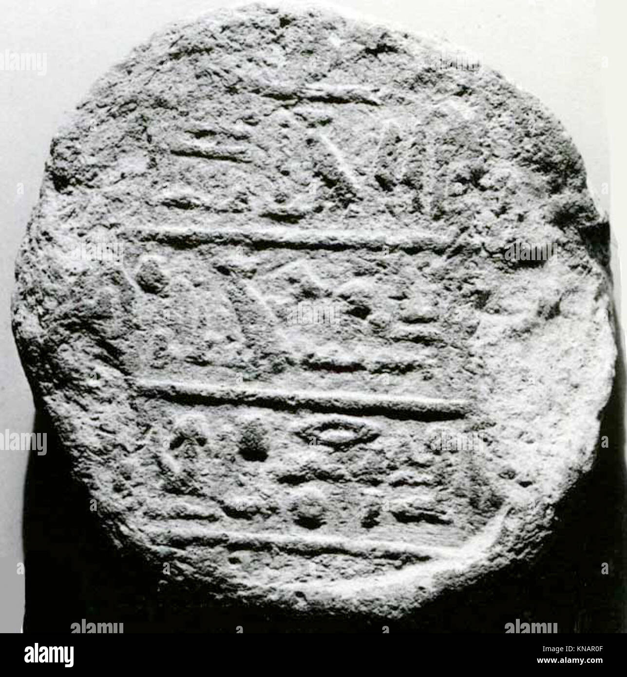 This funerary cone is an Egyptian artifact that marks the tomb of the ...
