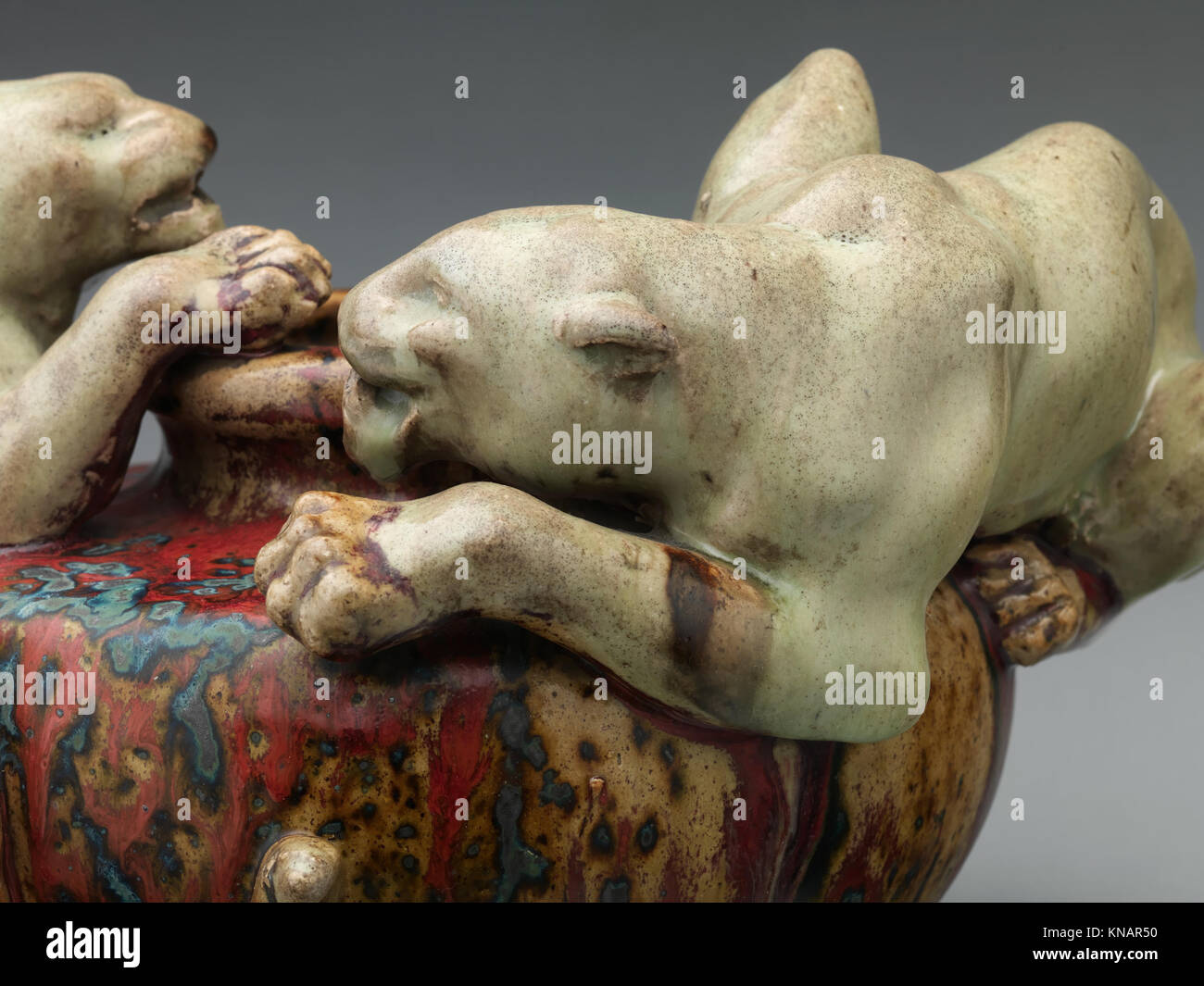 This bowl is adorned with two panthers, displaying intricate design and ...