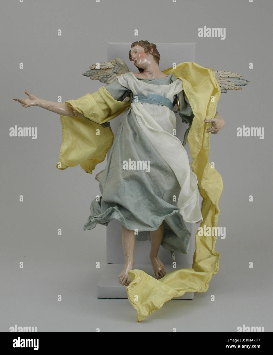 This depiction of an angel emphasizes religious and spiritual symbolism ...