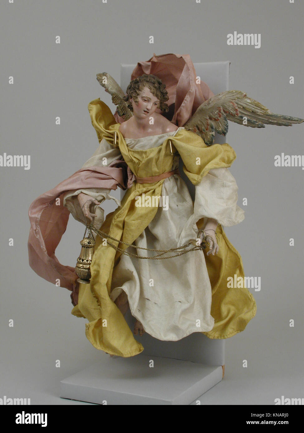 This sculpture of an angel, part of the MET collection, represents ...