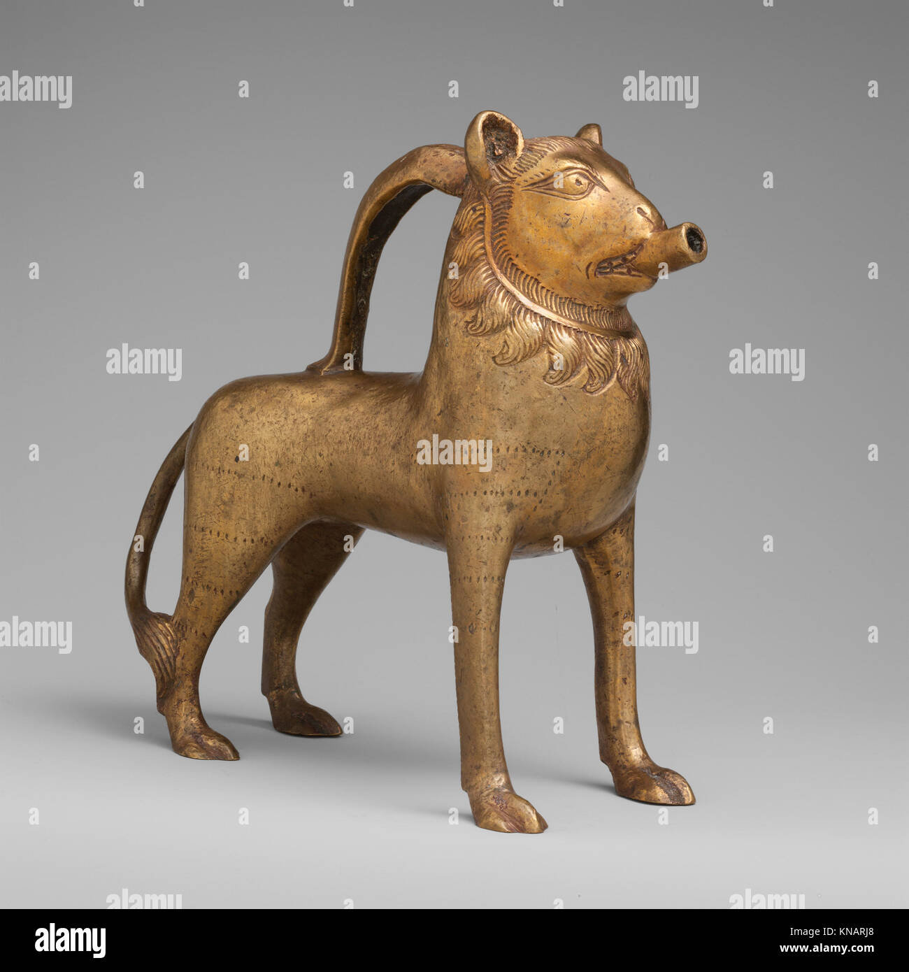 This aquamanile, shaped like a lion, is a ceremonial water container ...