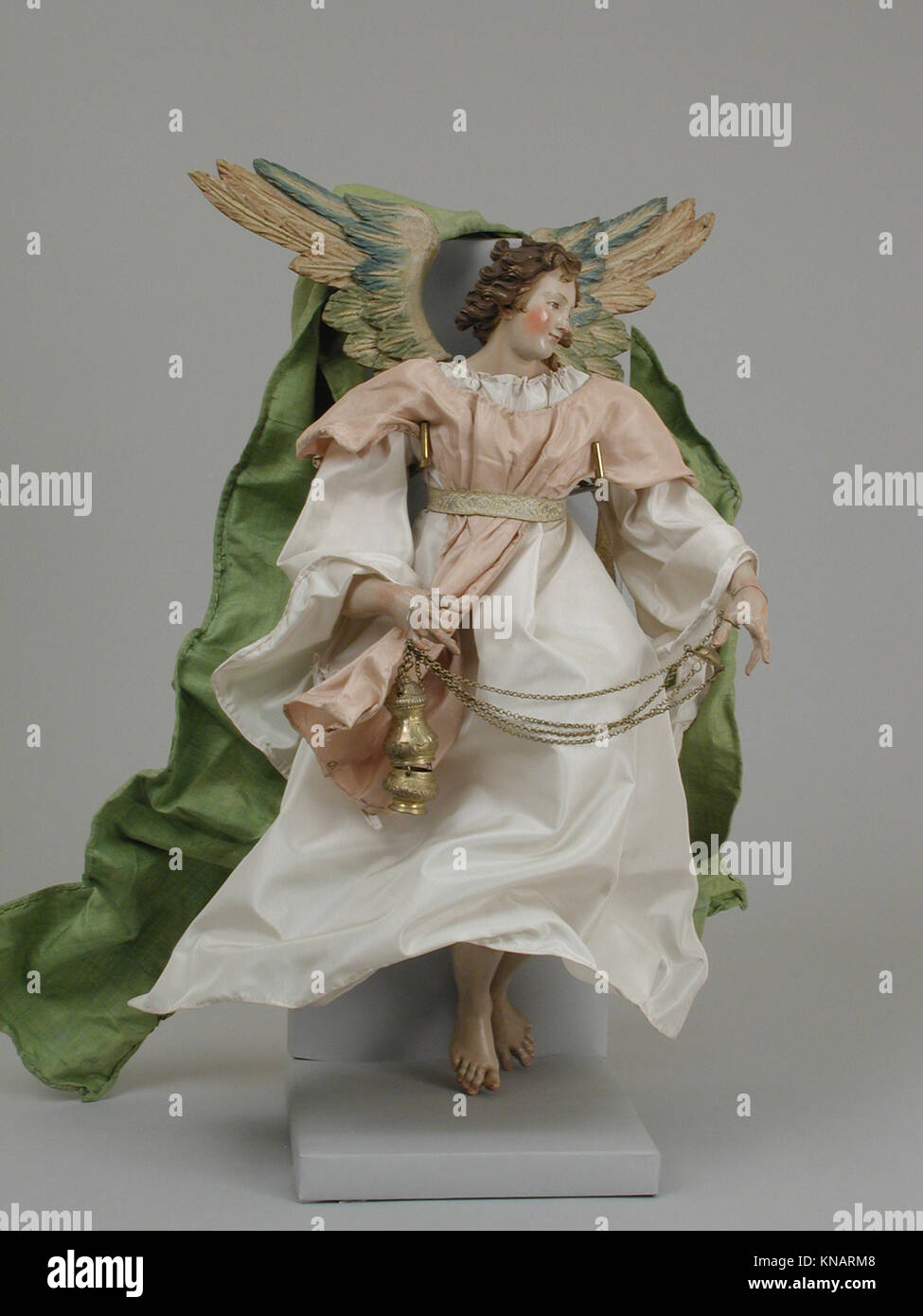 This depiction of an angel captures the divine figure with delicate ...
