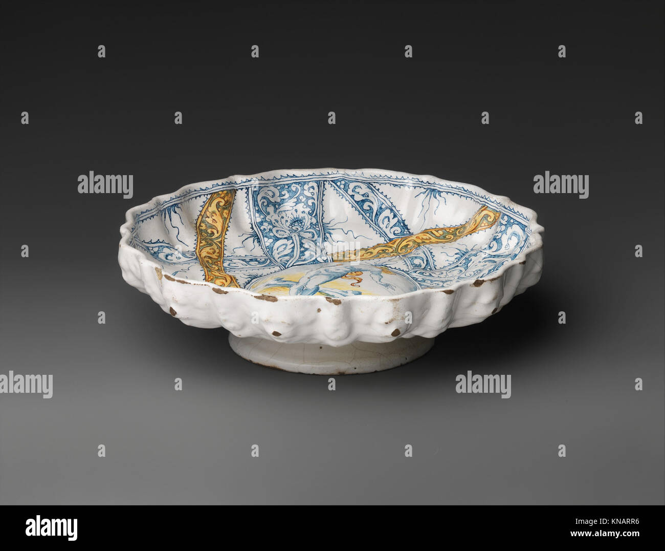 This Faenza white maiolica bowl, attributed to the workshop of Leonardo ...