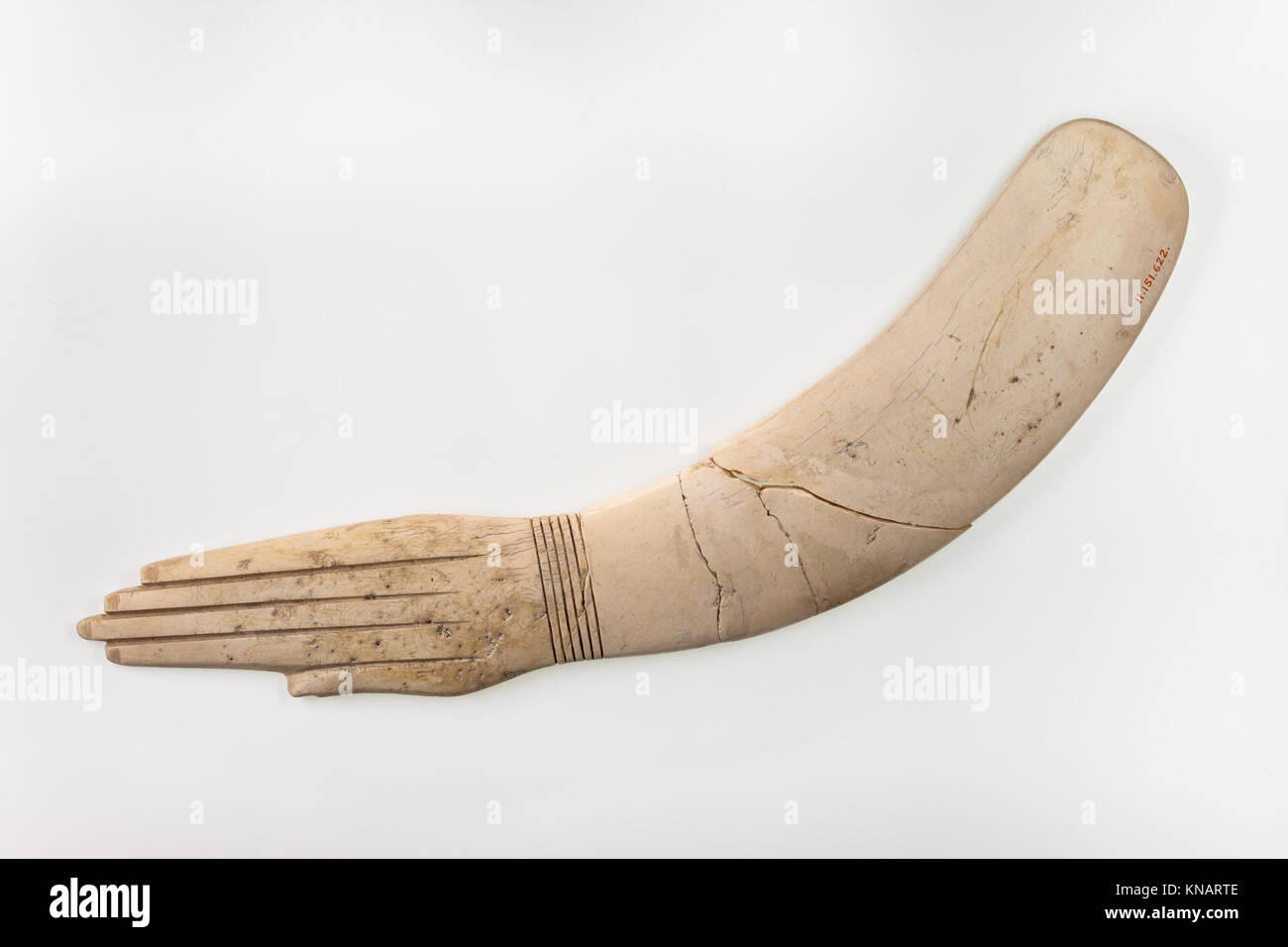 This clapper, used in religious or ceremonial settings, is a small ...