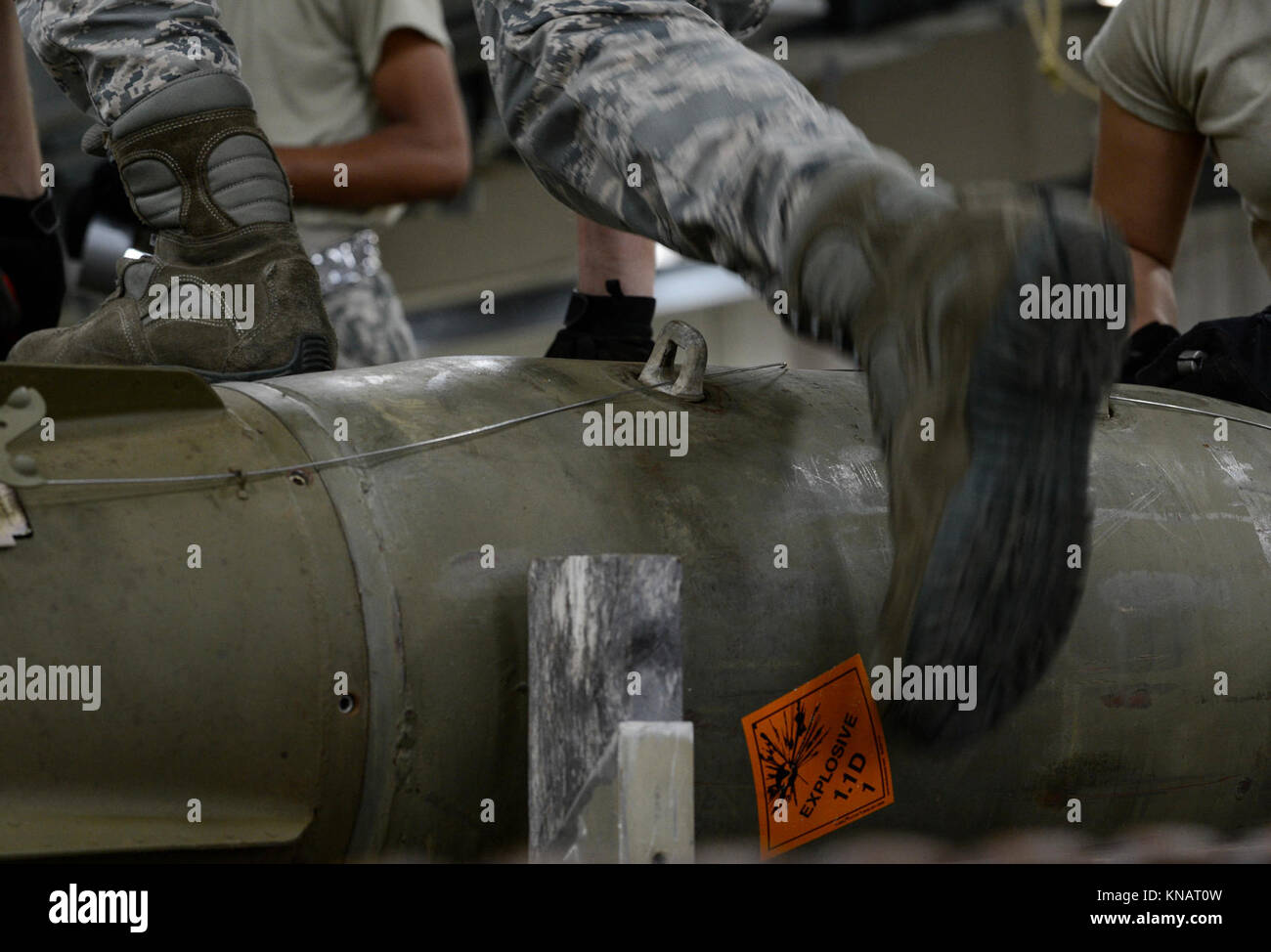 Airmen from the 2nd Munitions Squadron Production Flight assemble M-117 ...