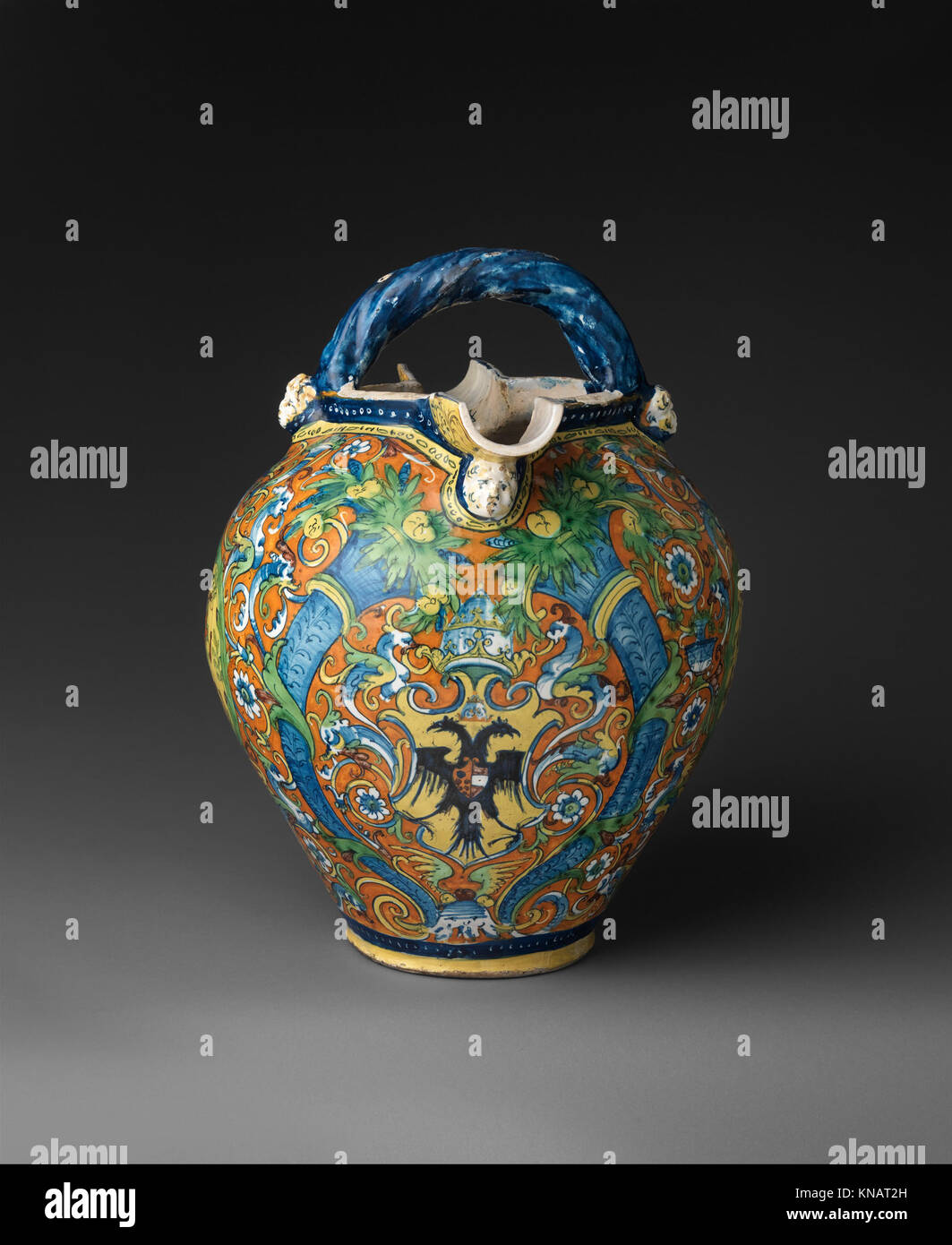 This ceremonial double-spouted armorial ewer displays heraldic ...