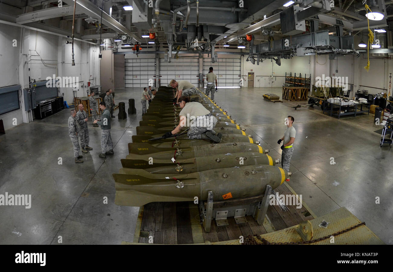 Airmen from the 2nd Munitions Squadron Production Flight assembles M ...