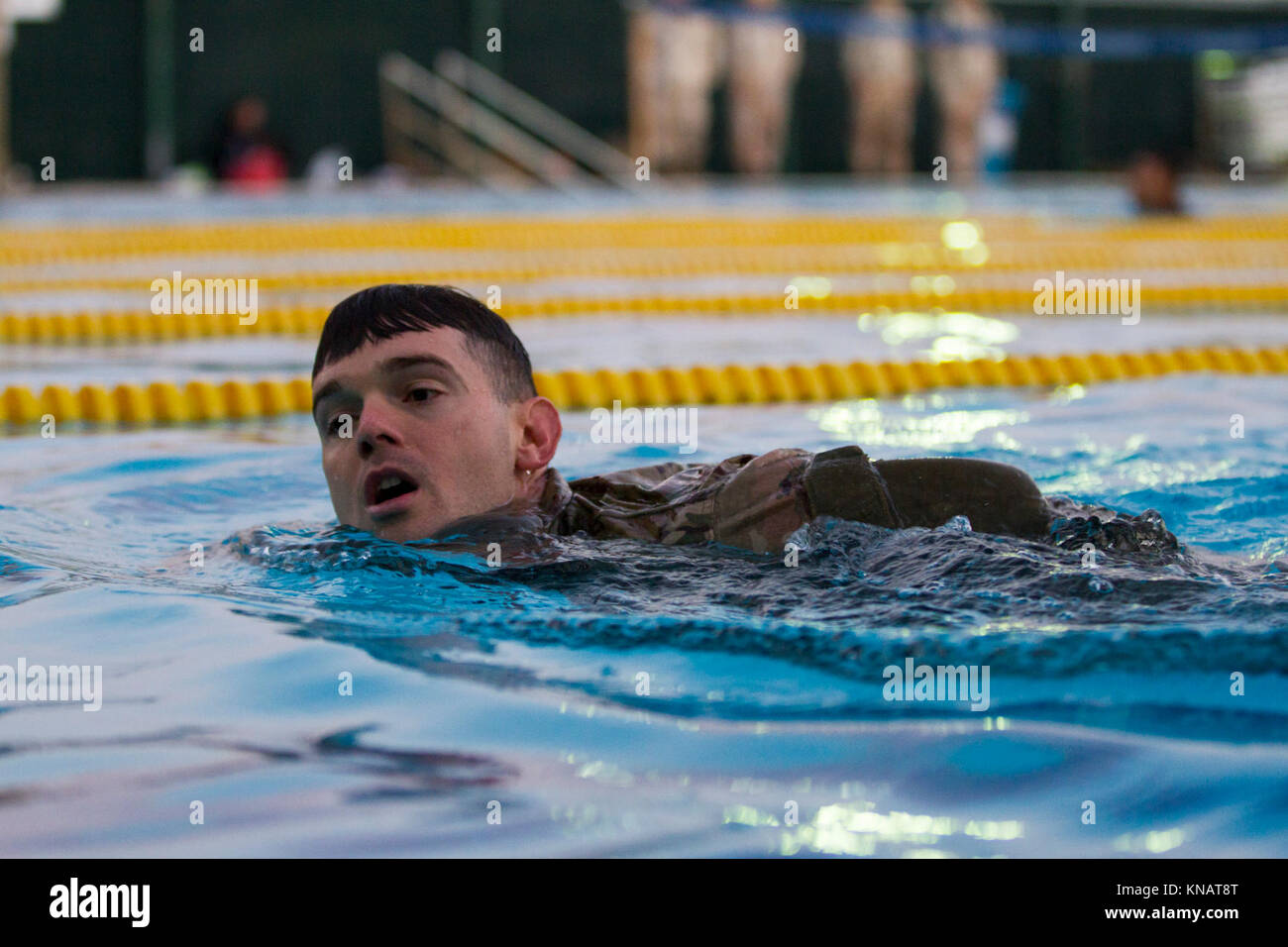 A U.S. Army Soldier swims forward during the 100-meter swim for the ...