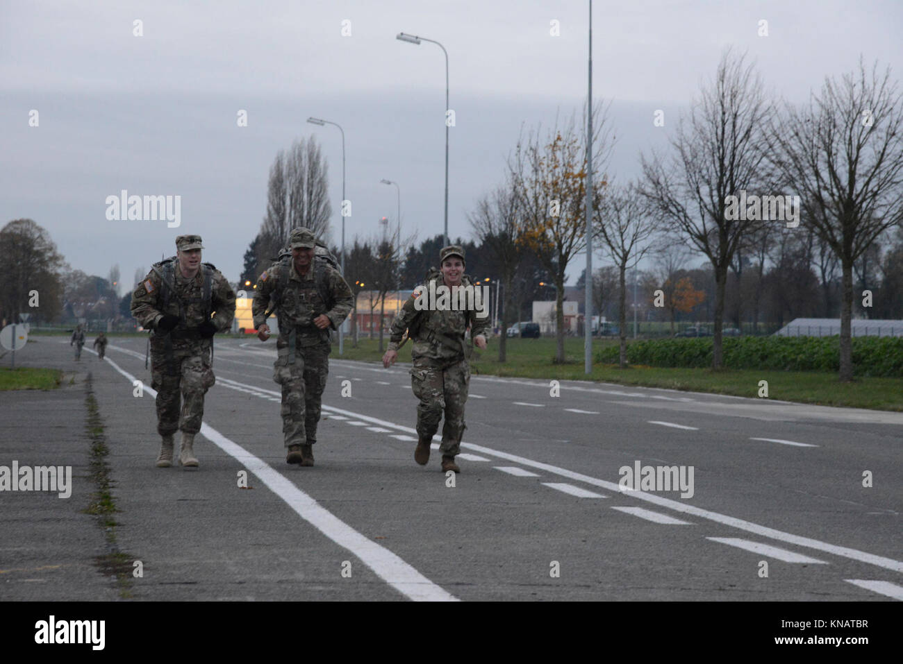 Three Soldiers of the 39th Strategic Signal Battalion participate in a ...