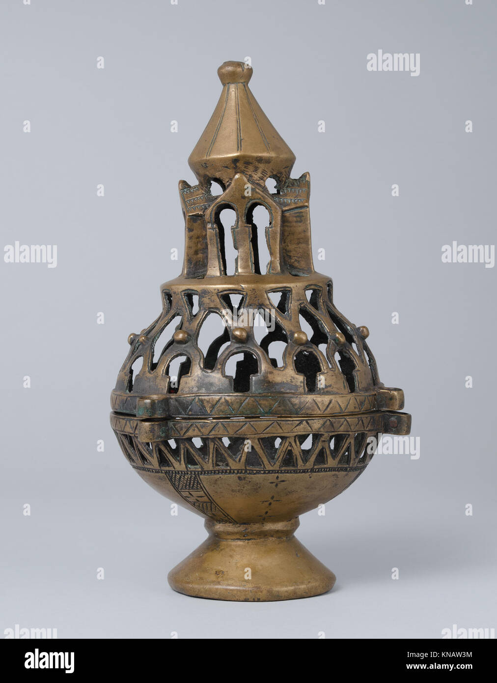This censer, often used in religious rituals, is a vessel for burning ...