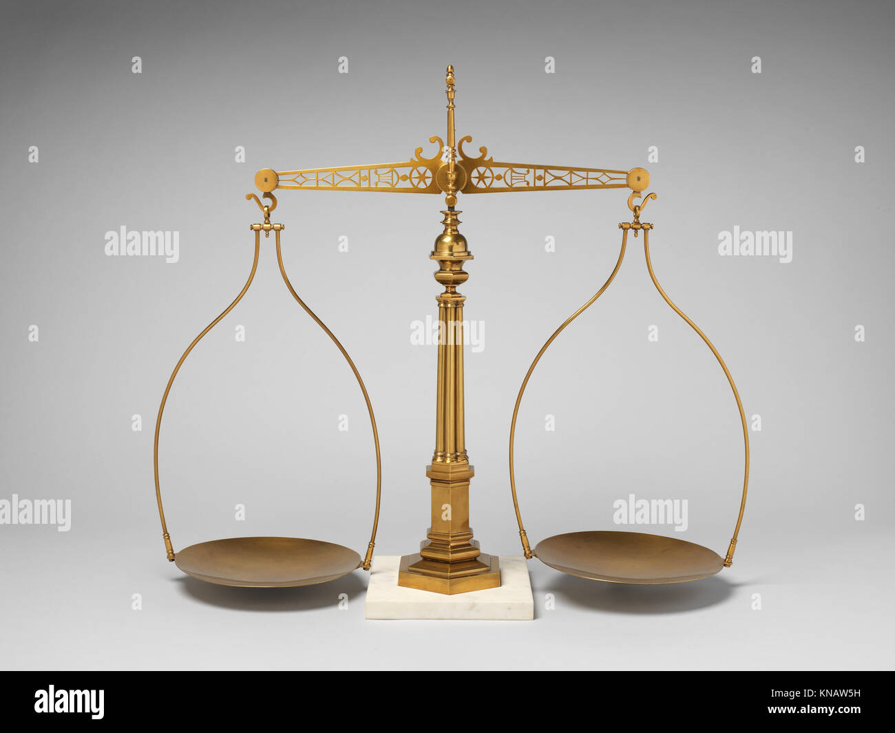This balance scale is a functional object used for weighing items in ...
