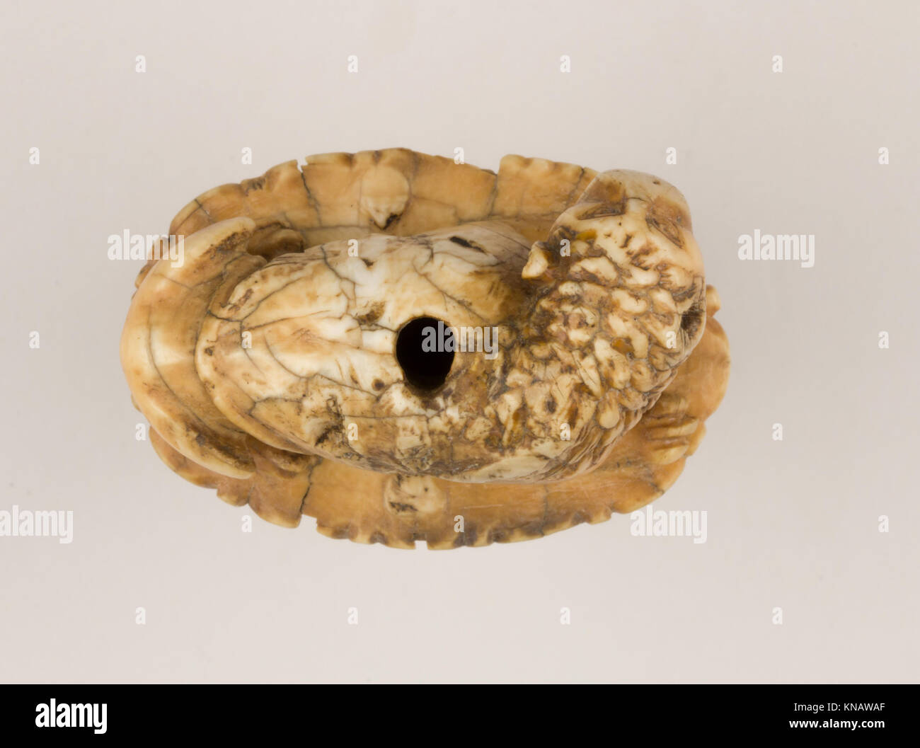 The hilt of this dagger features intricate metalwork, indicating the ...