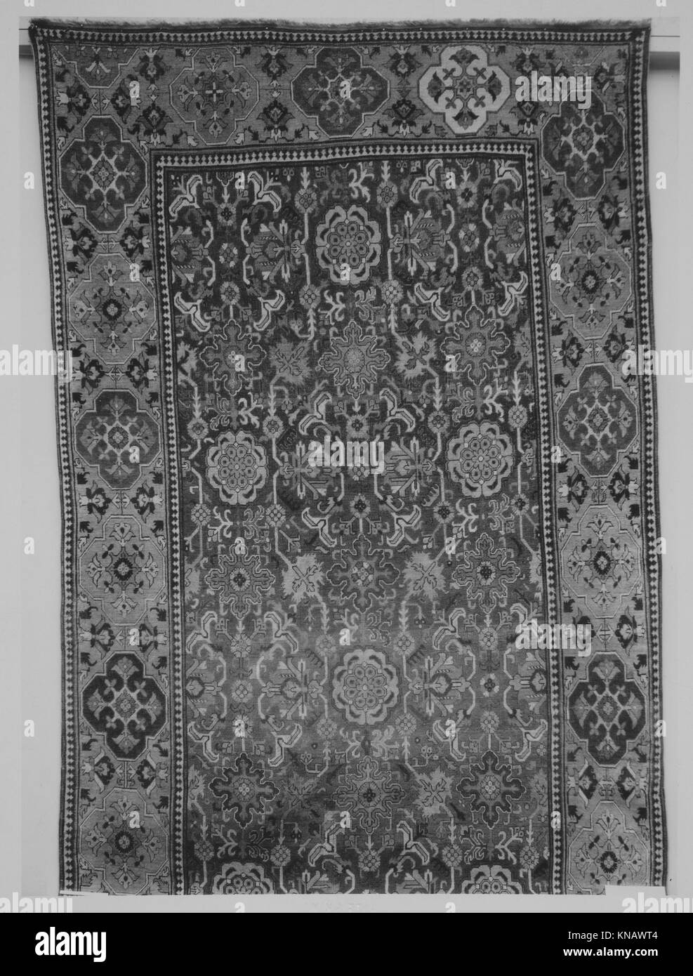 A carpet from the MET collection, featuring intricate patterns and ...