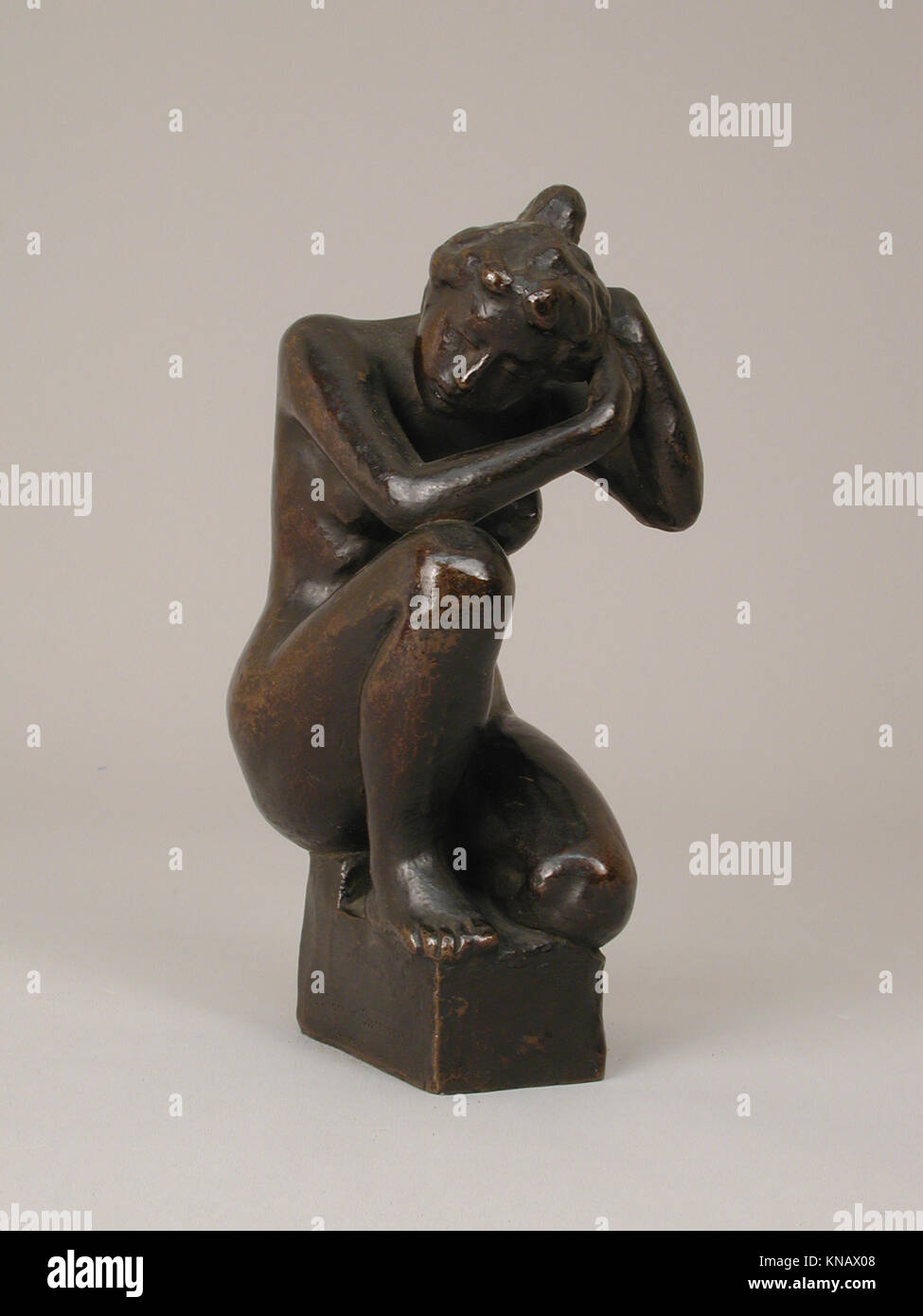 A sculpture titled 'Crouching Girl' from the MET collection, capturing ...