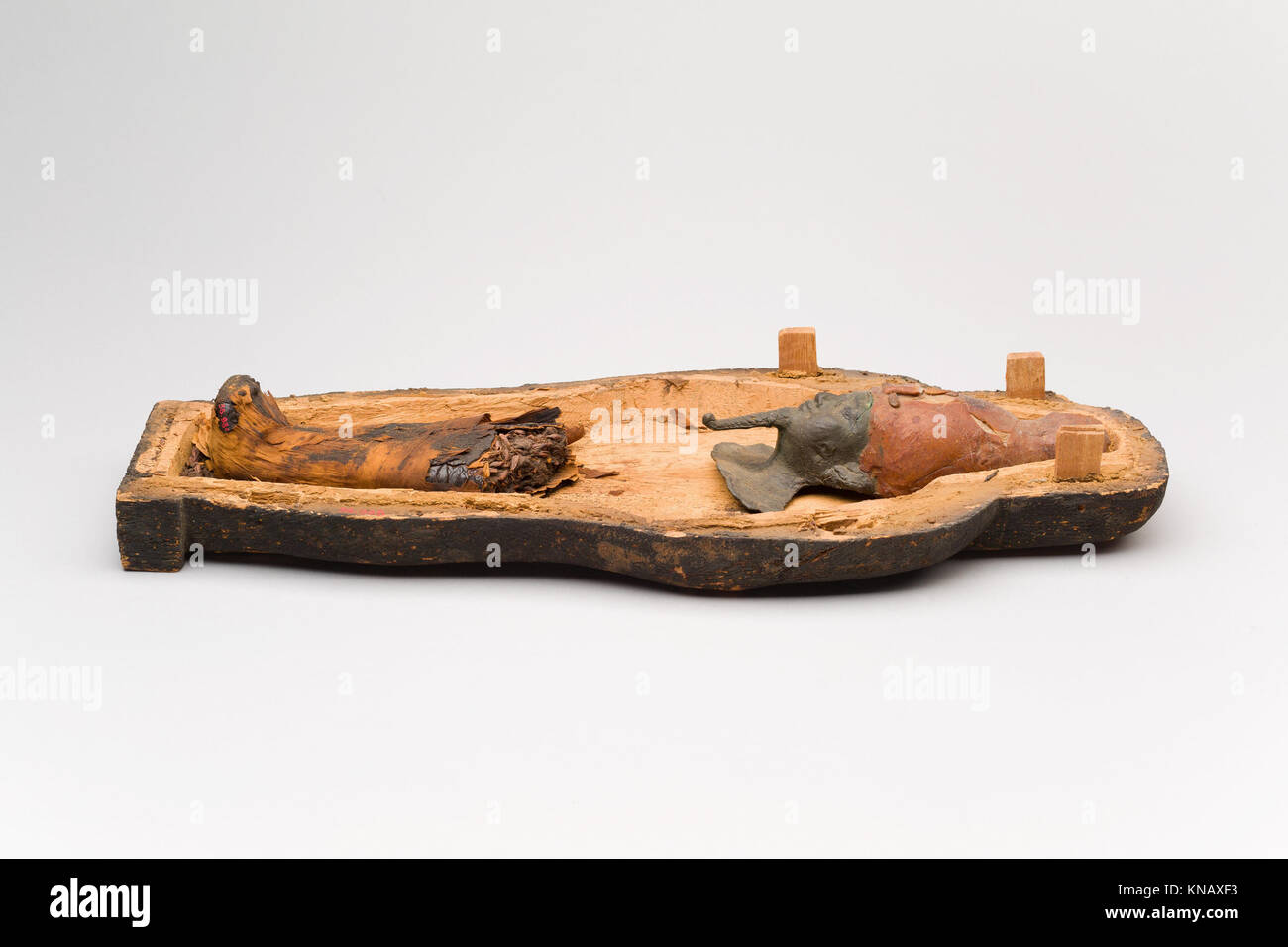 Coffin and corn mummy with Osiris mask illustrate Egyptian burial ...