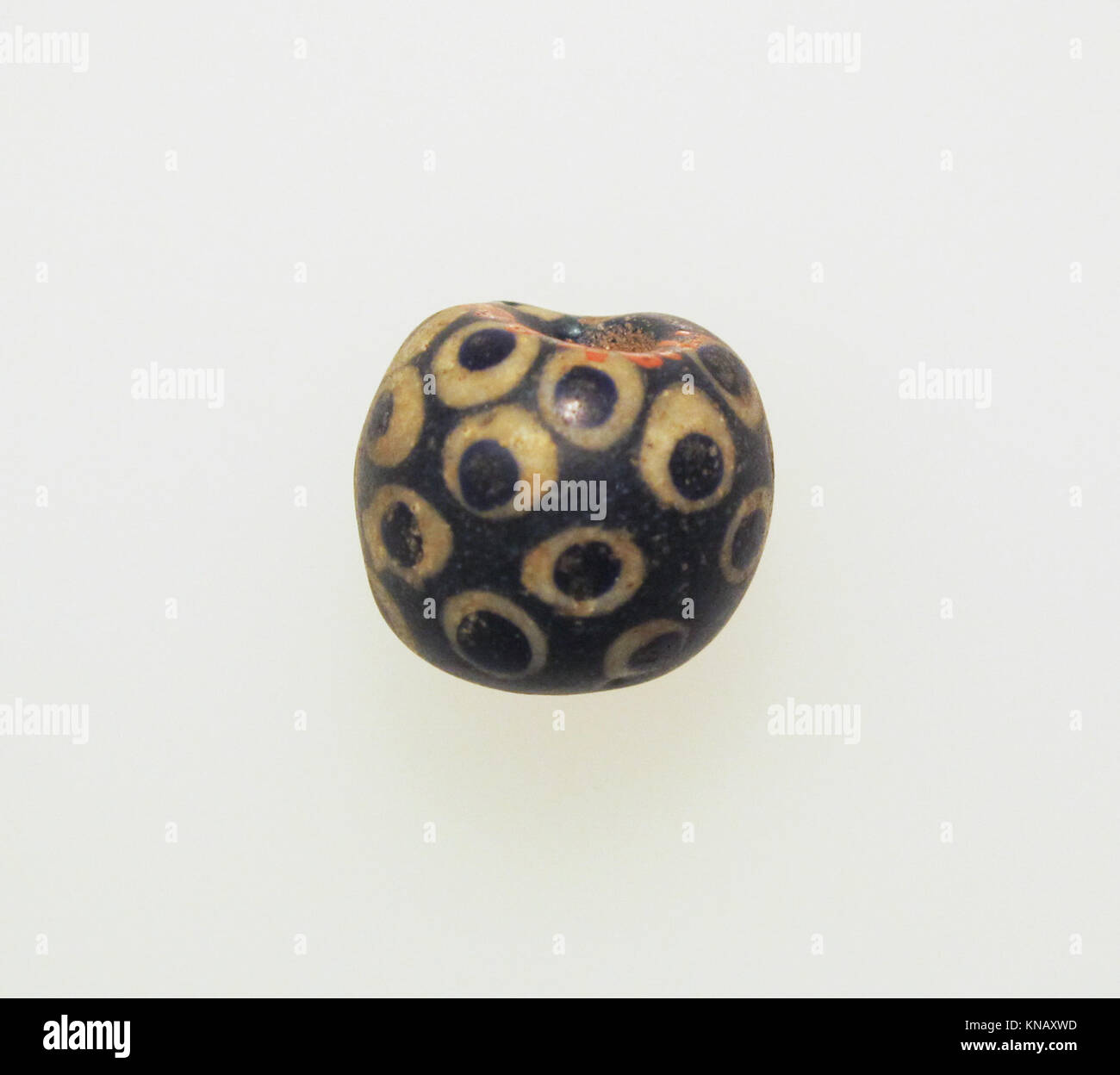 This glass eye bead, part of the MET collection, demonstrates the fine ...