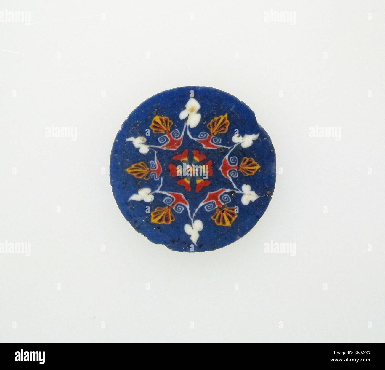 A glass mosaic inlay, featuring colorful and intricate design. The ...