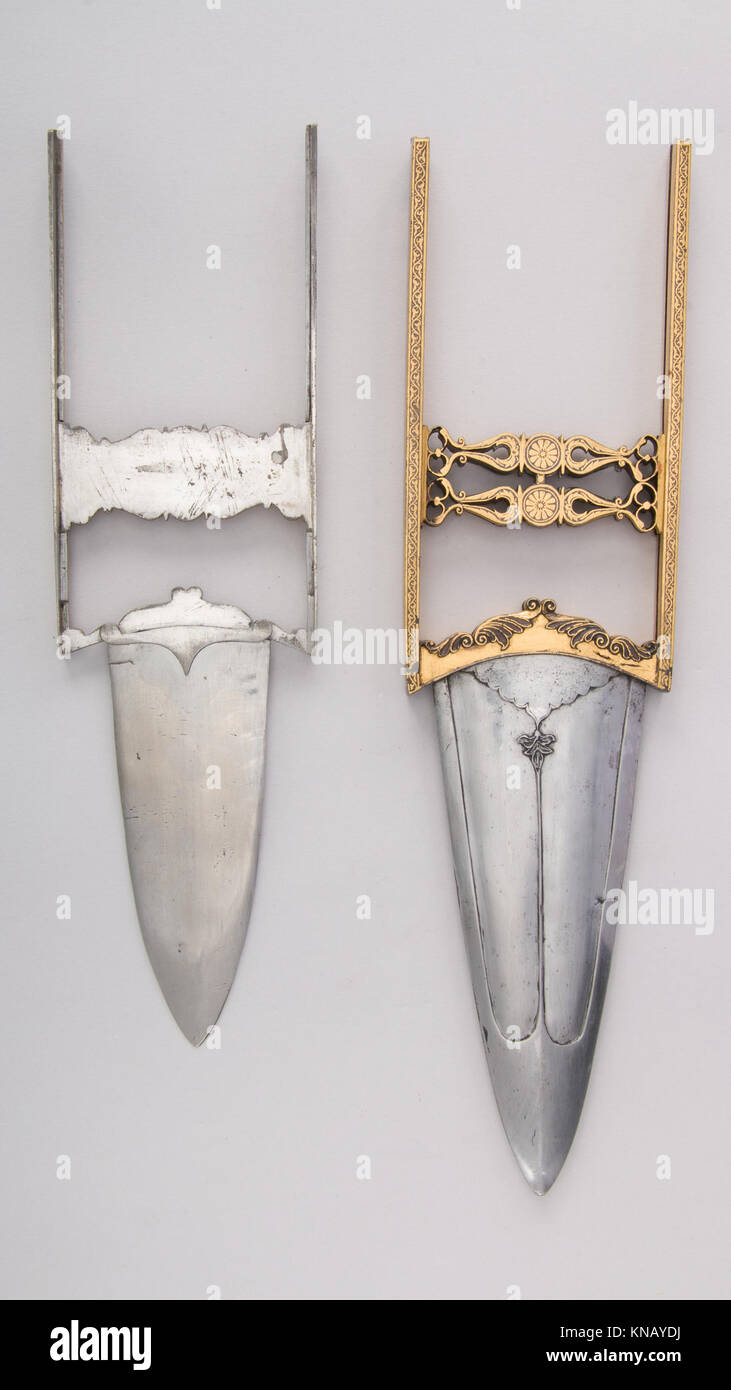 This Katar, a type of dagger, includes both a sheath and a blade ...