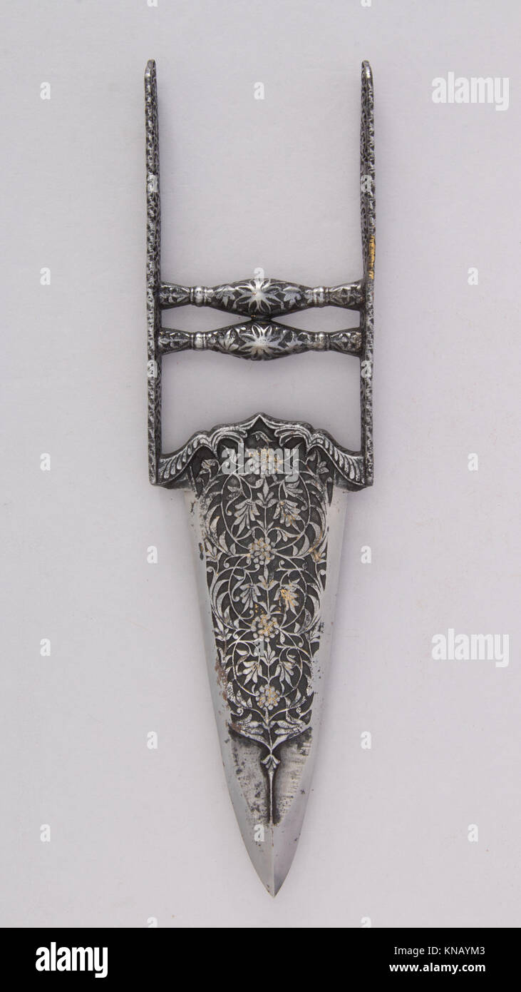 This katar dagger is a traditional weapon featuring a distinctive hilt ...